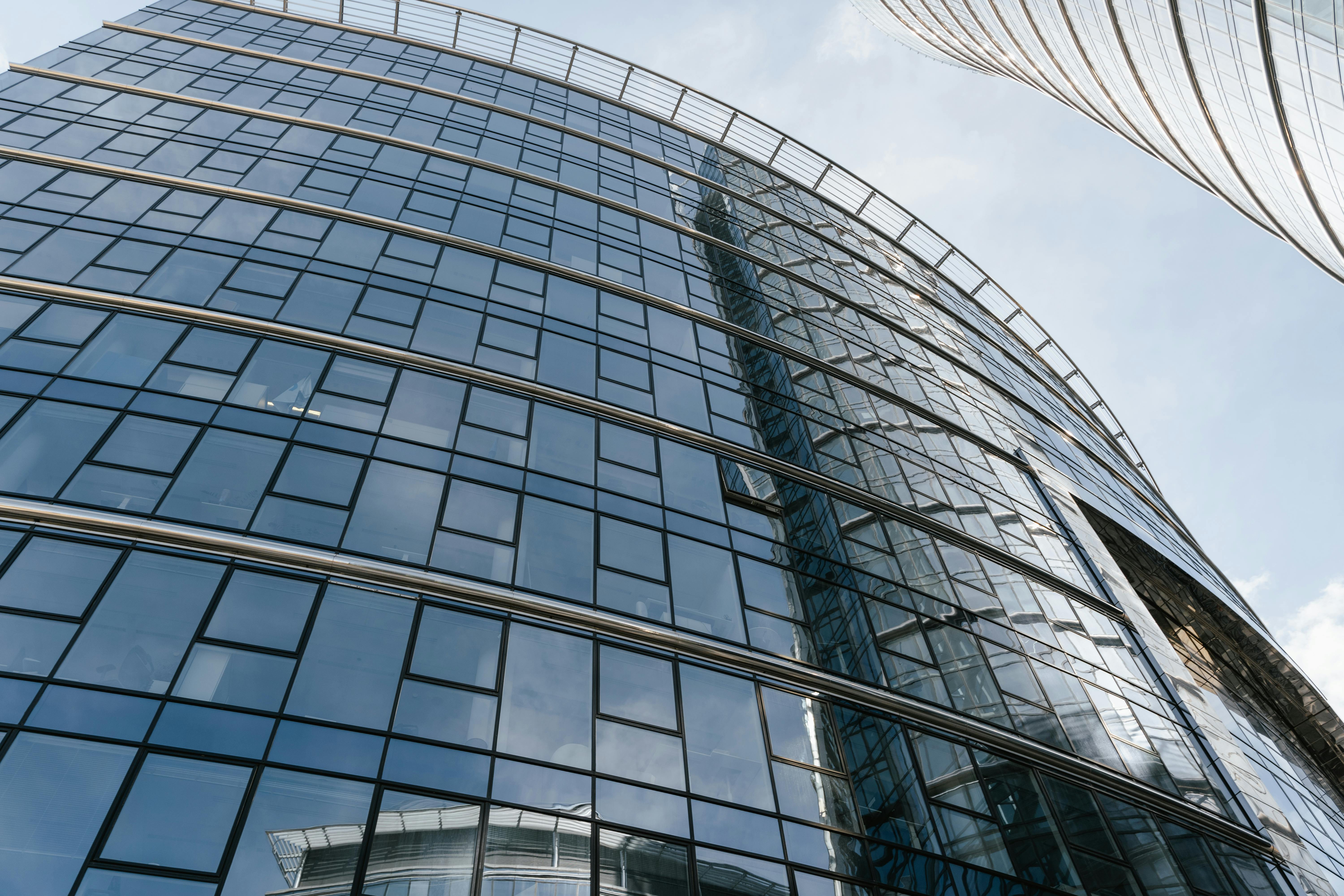 Glass Walled High Rise Building · Free Stock Photo