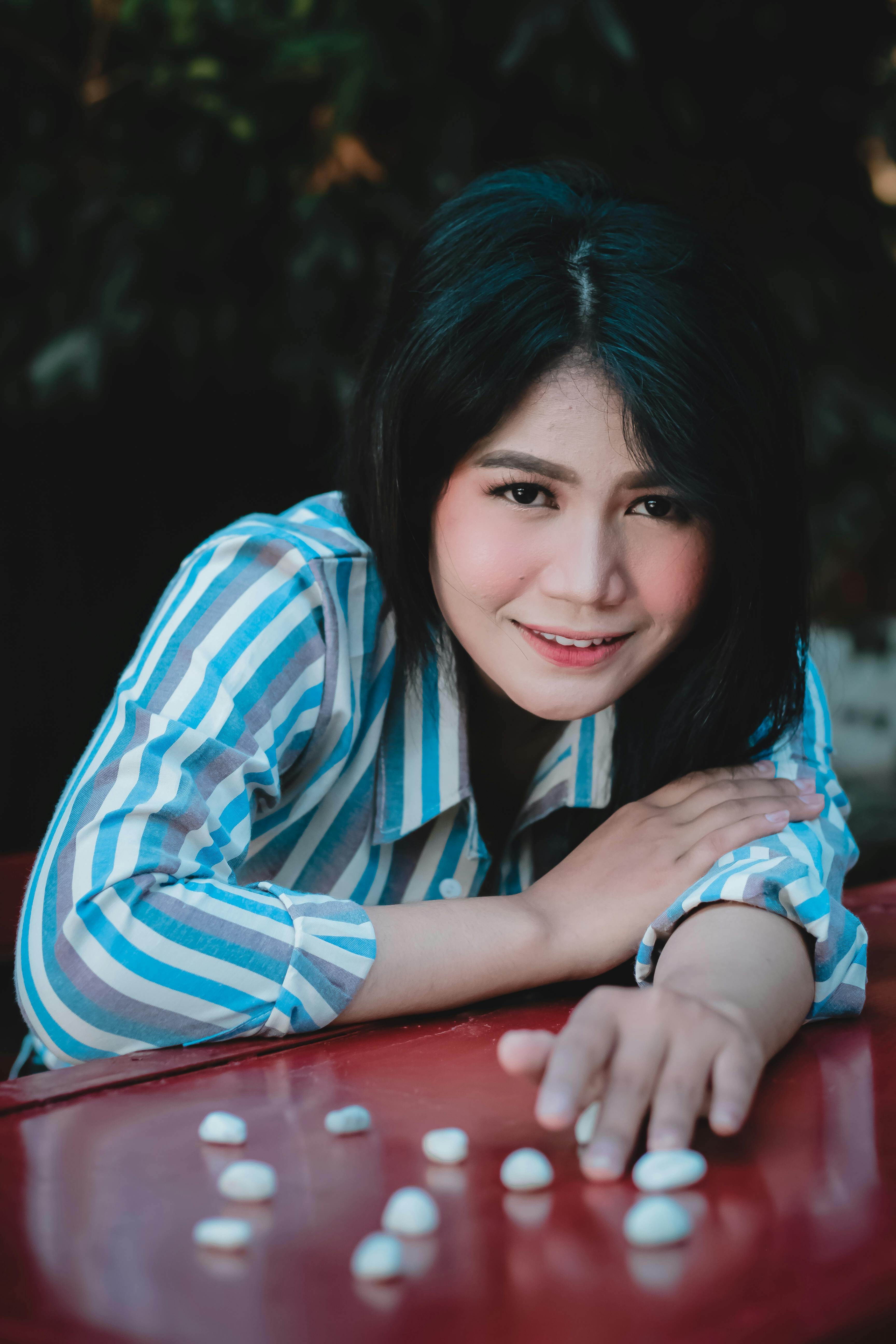 Woman Smiling Gently · Free Stock Photo