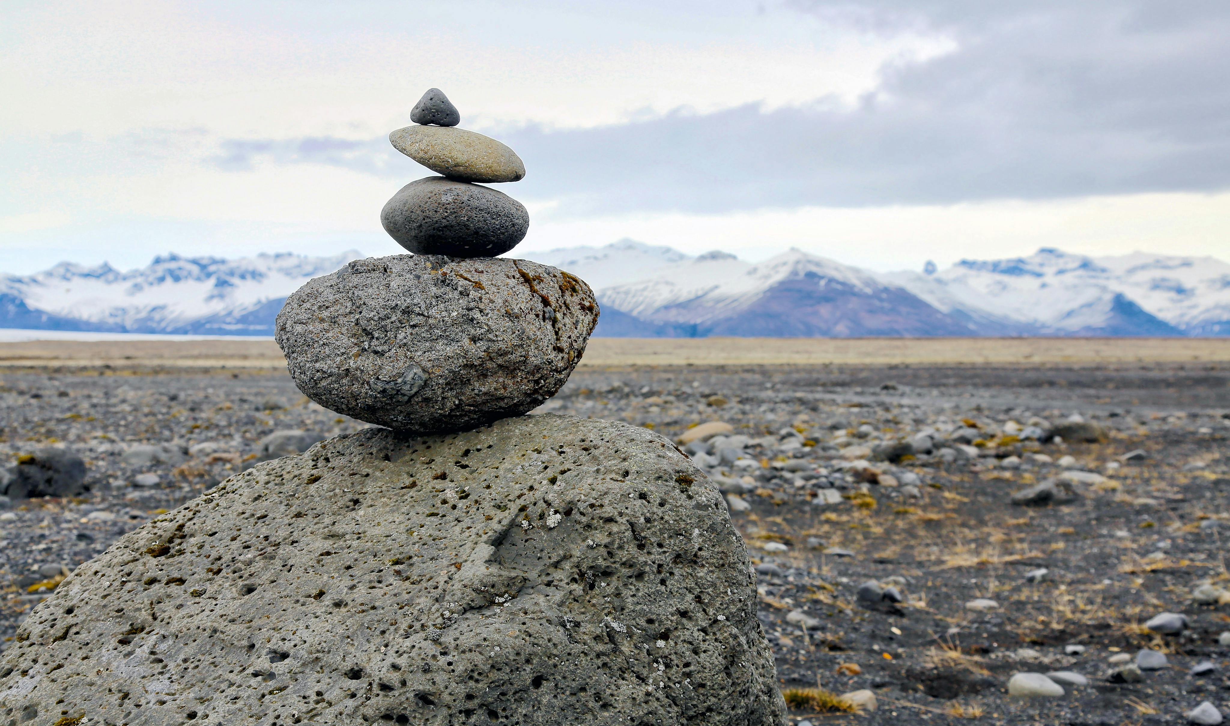 A Close-Up Shot of Rock Balancing · Free Stock Photo