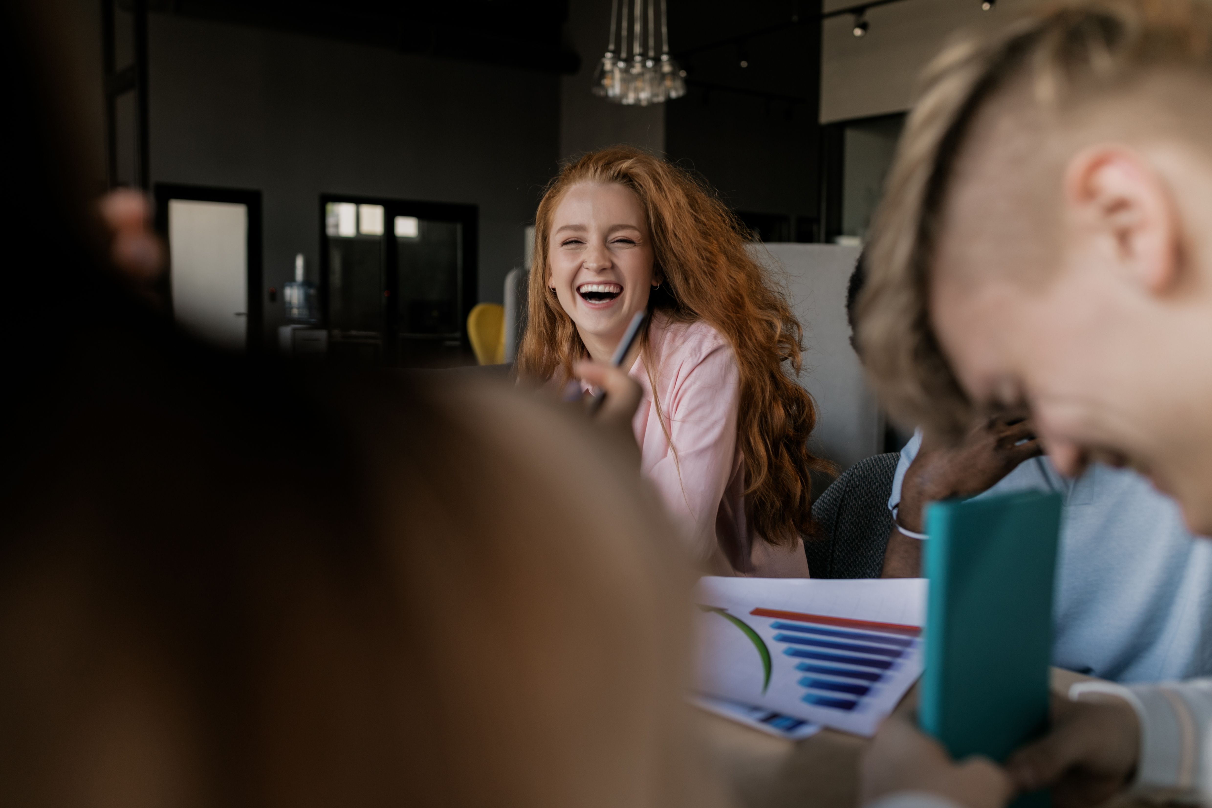 Woman Wearing Sweater Laughing · Free Stock Photo