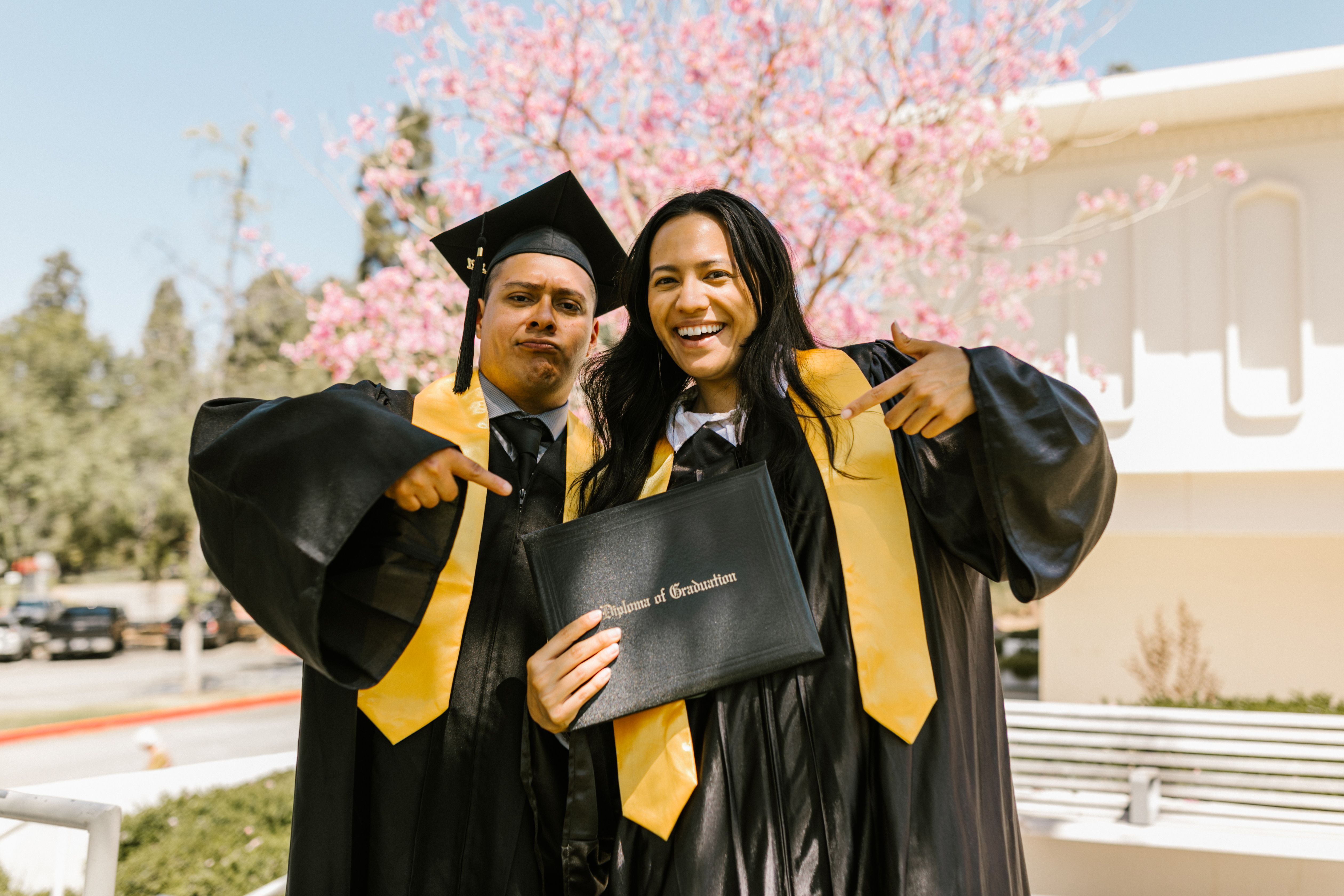 Students Wearing Graduation Gowns Climbing Concrete stairs · Free Stock ...