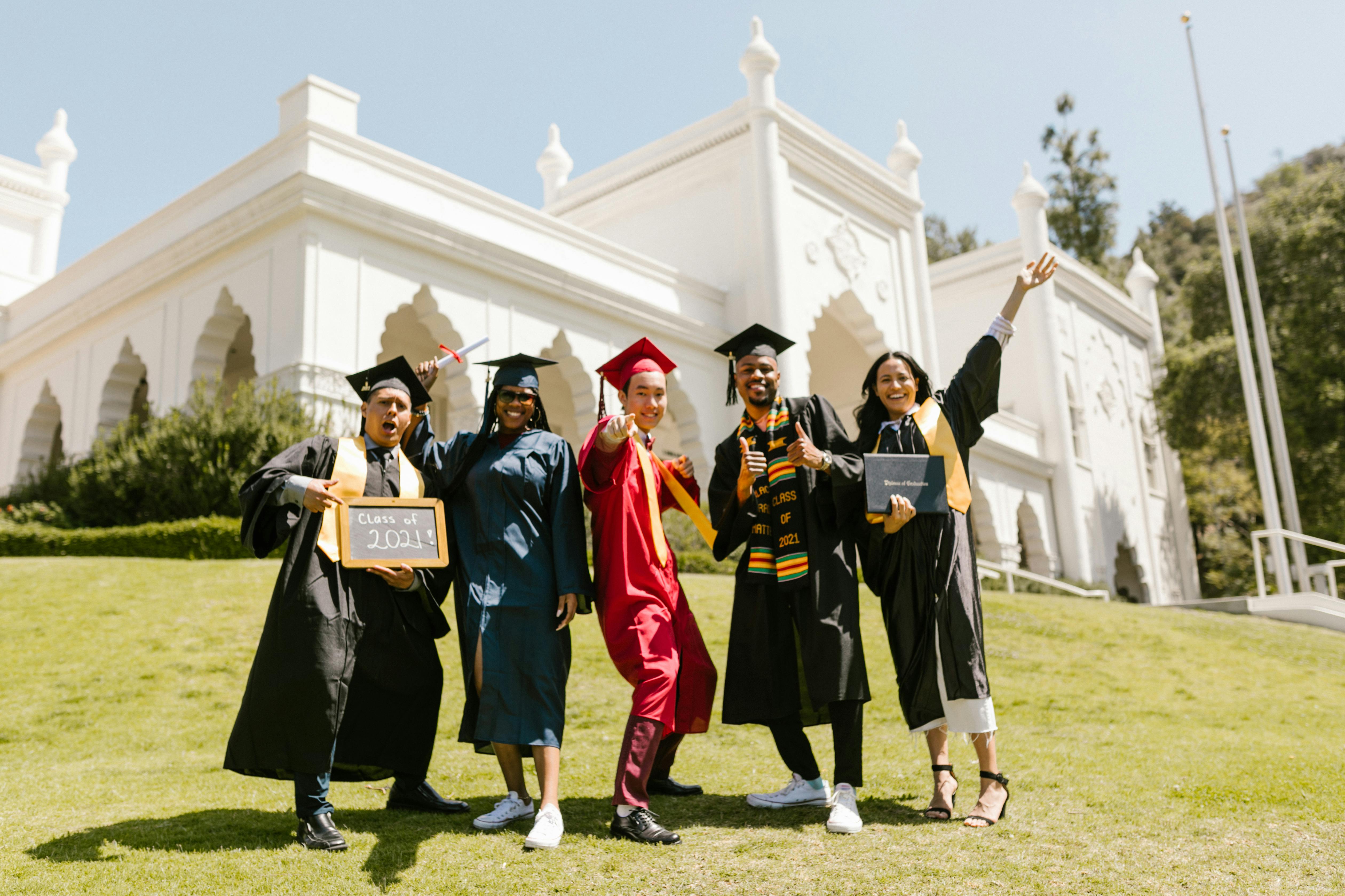 Students Wearing Graduation Gowns Climbing Concrete stairs · Free Stock ...