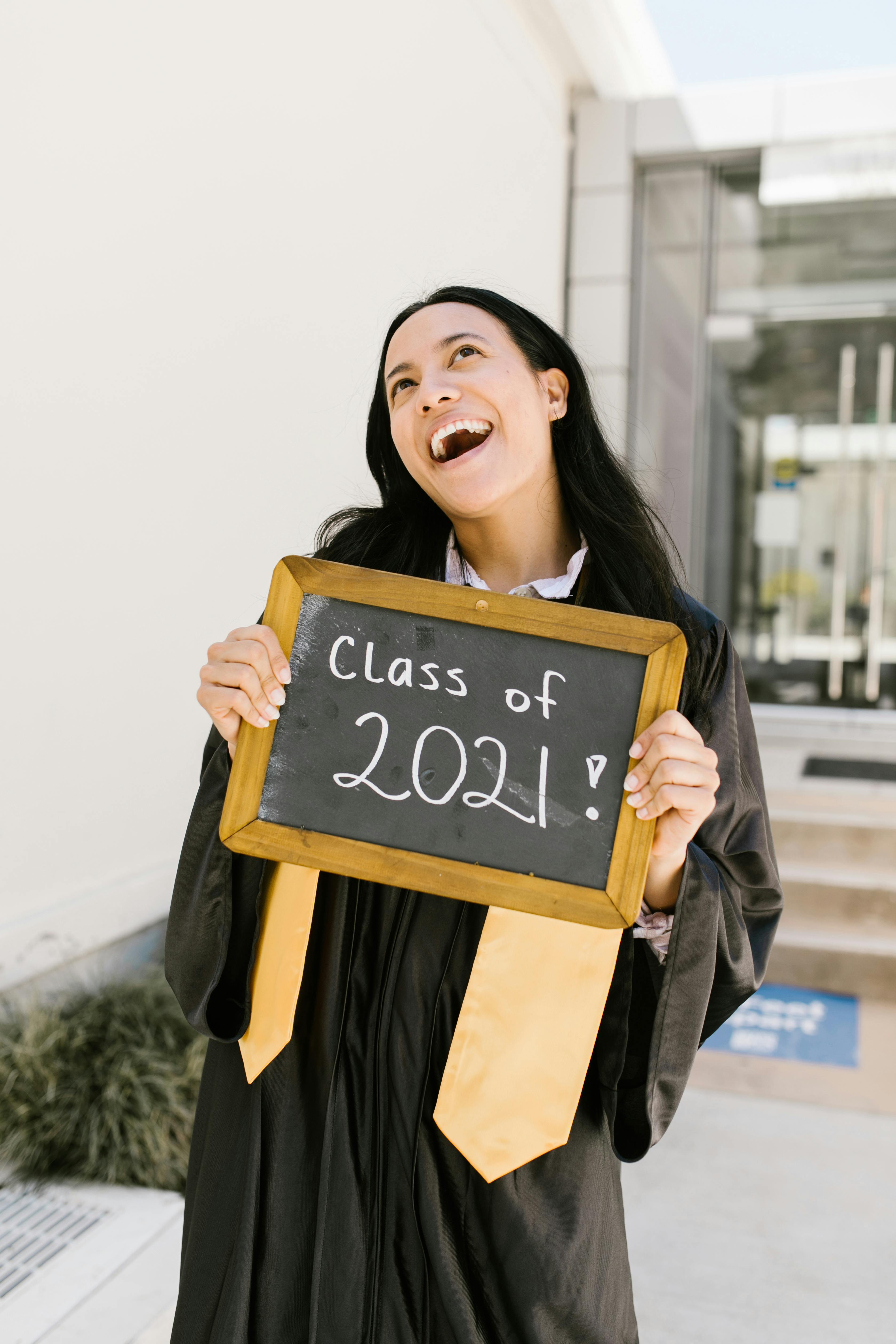 A Woman Wearing an Academic Dress · Free Stock Photo