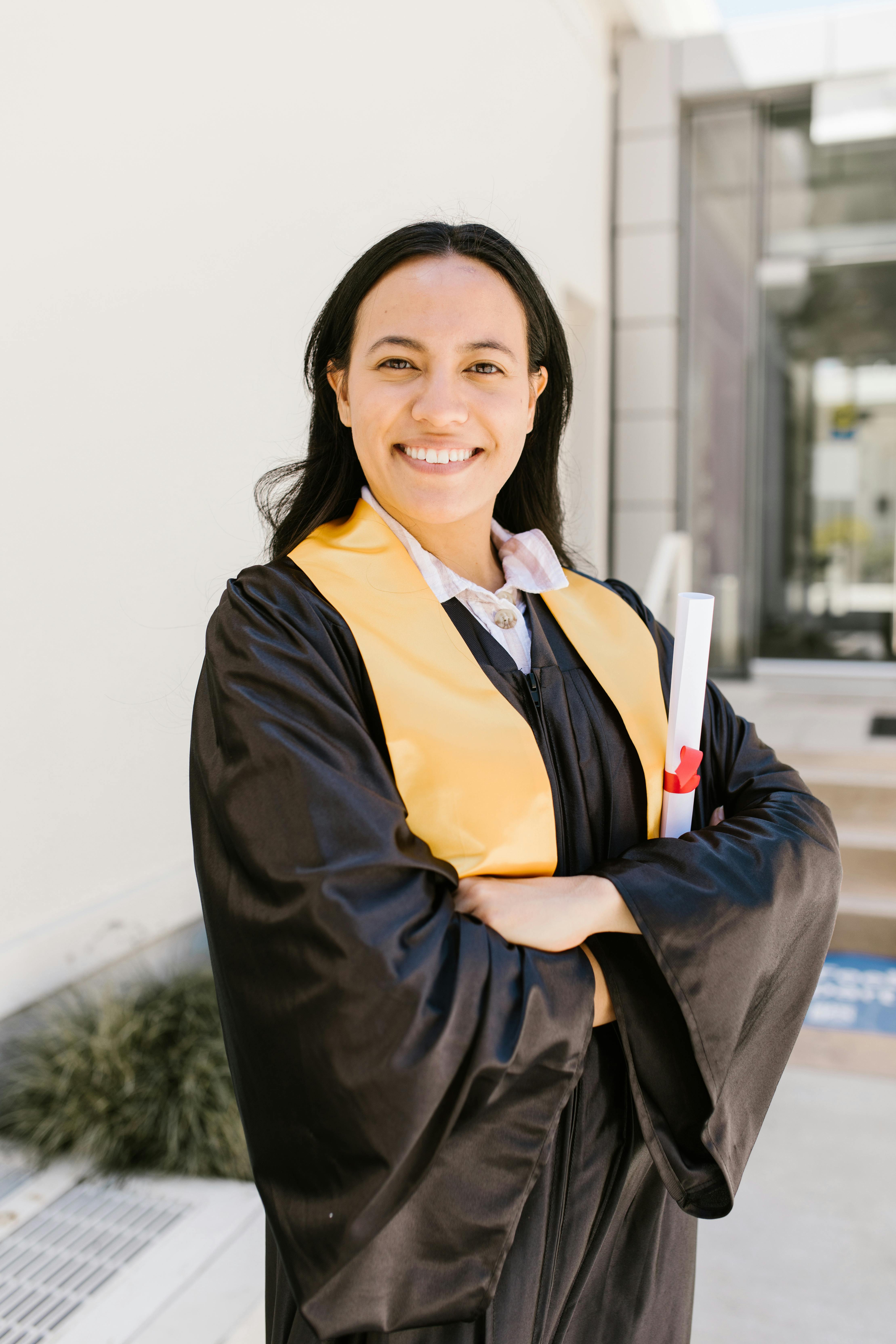 A Woman Wearing Her Academic Dress · Free Stock Photo