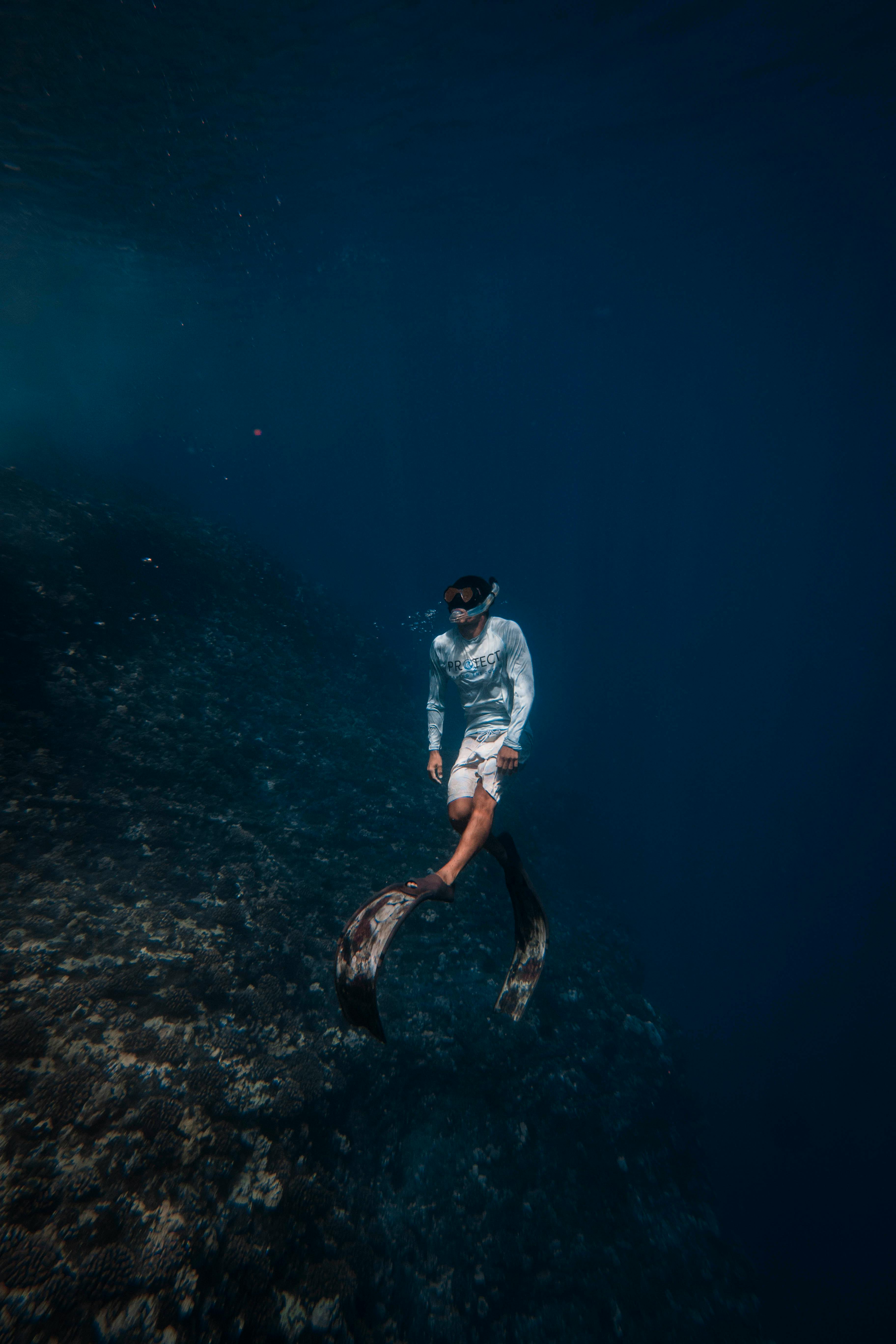 Man Diving in Ocean with Snorkel and Fins · Free Stock Photo