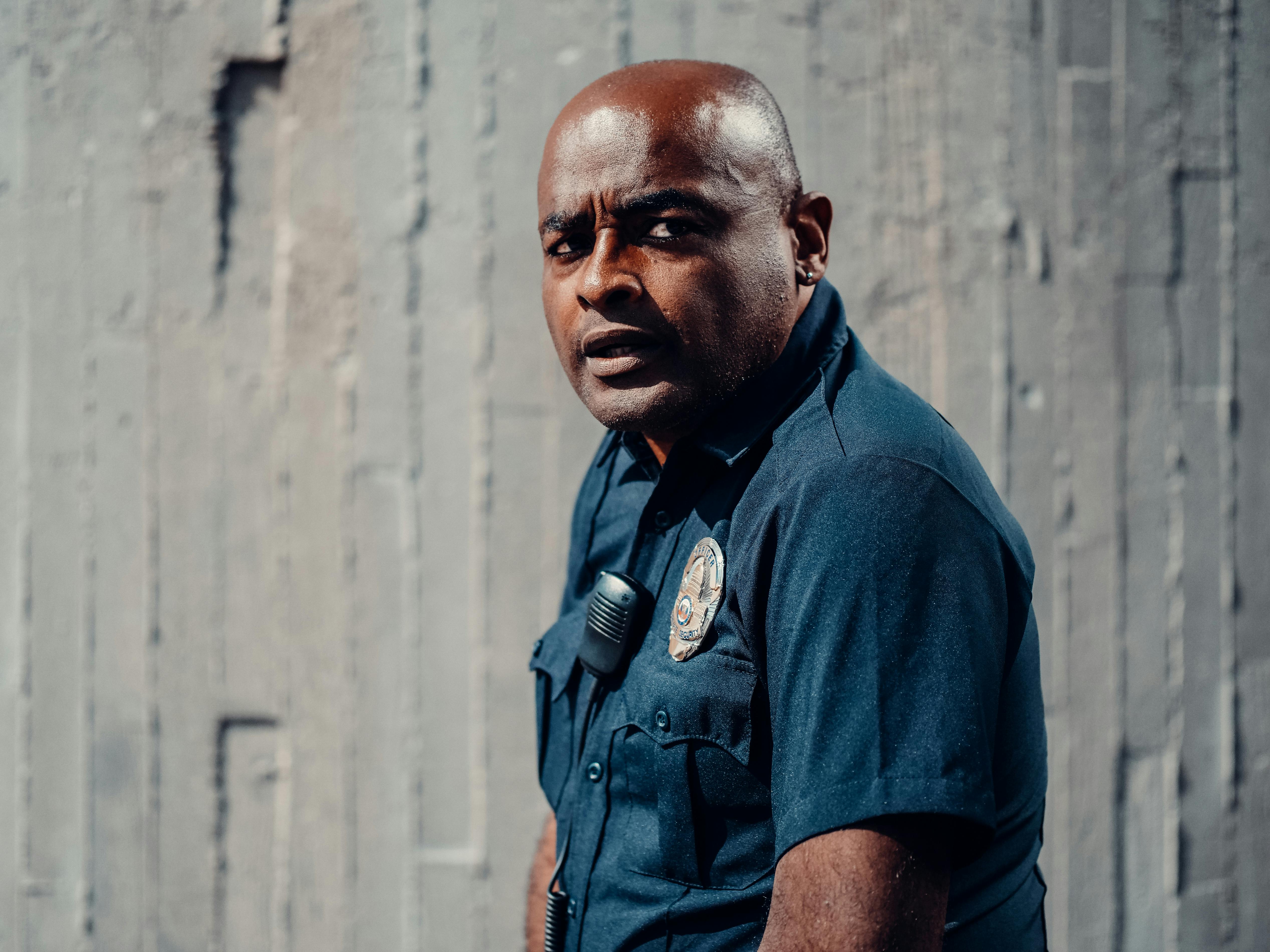 Man in Officer's Uniform Black Standing during Parade · Free Stock Photo