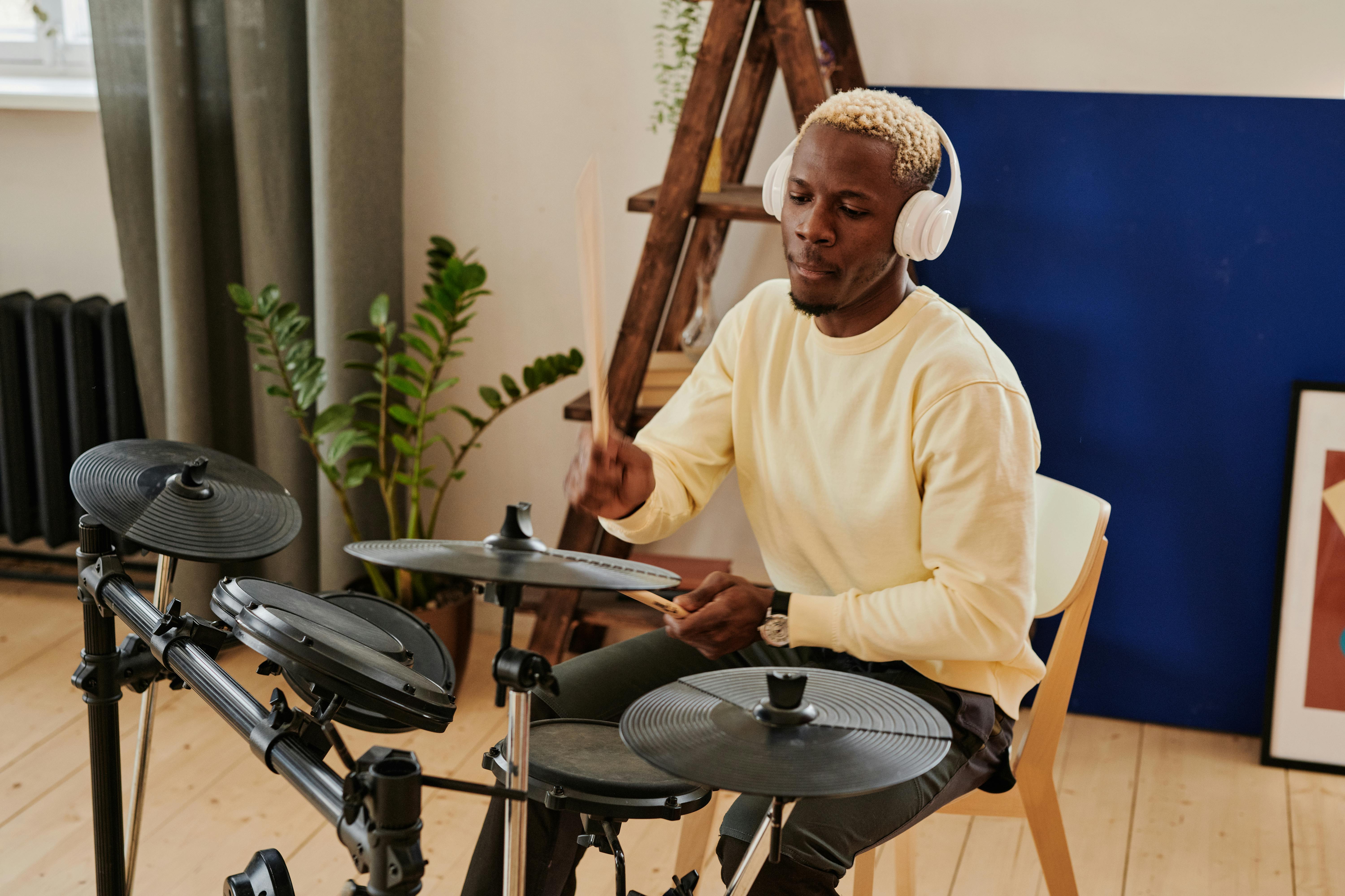 A Man Playing Electronic Drums · Free Stock Photo
