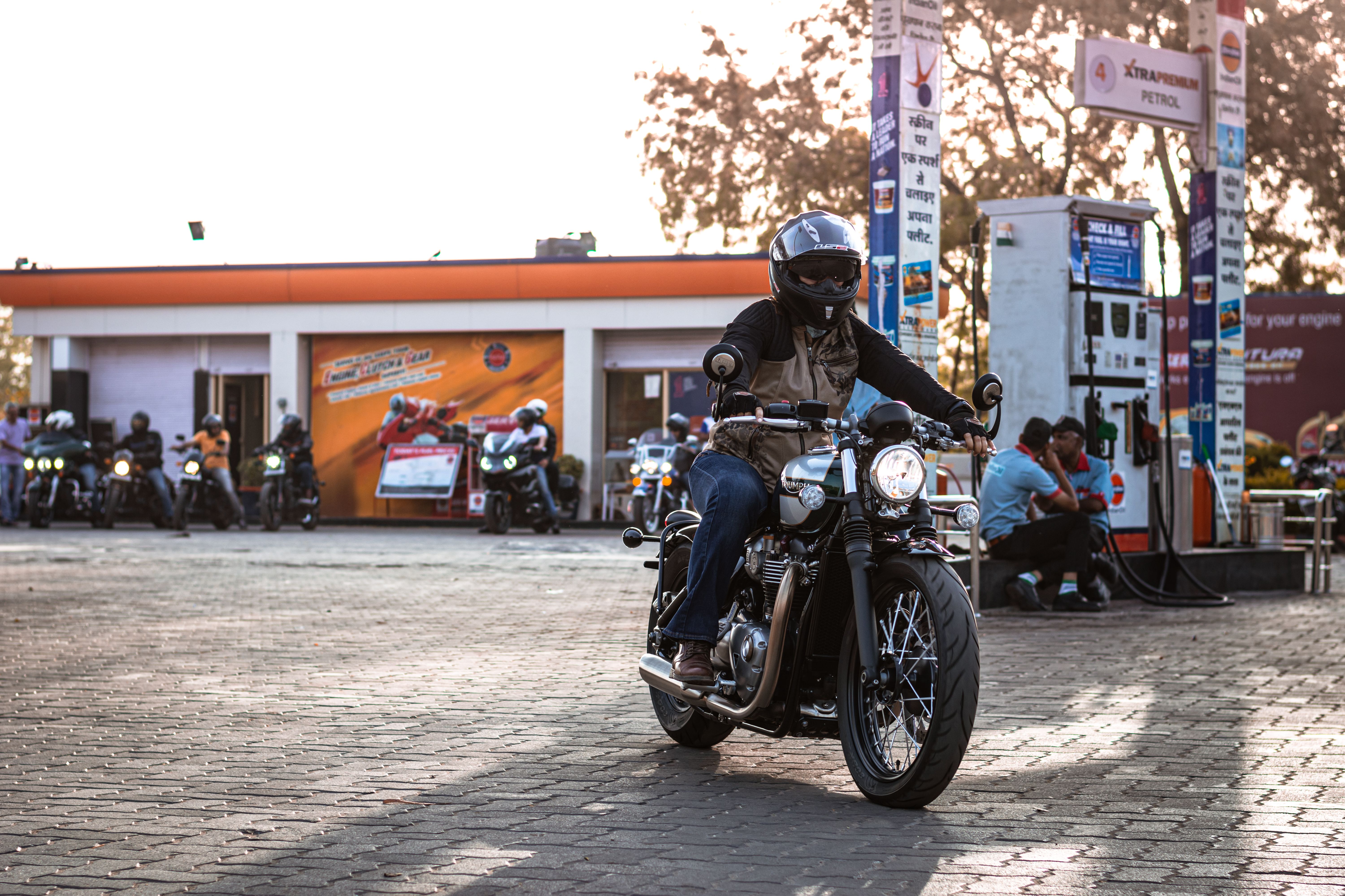 Person Riding a Black Motorcycle · Free Stock Photo