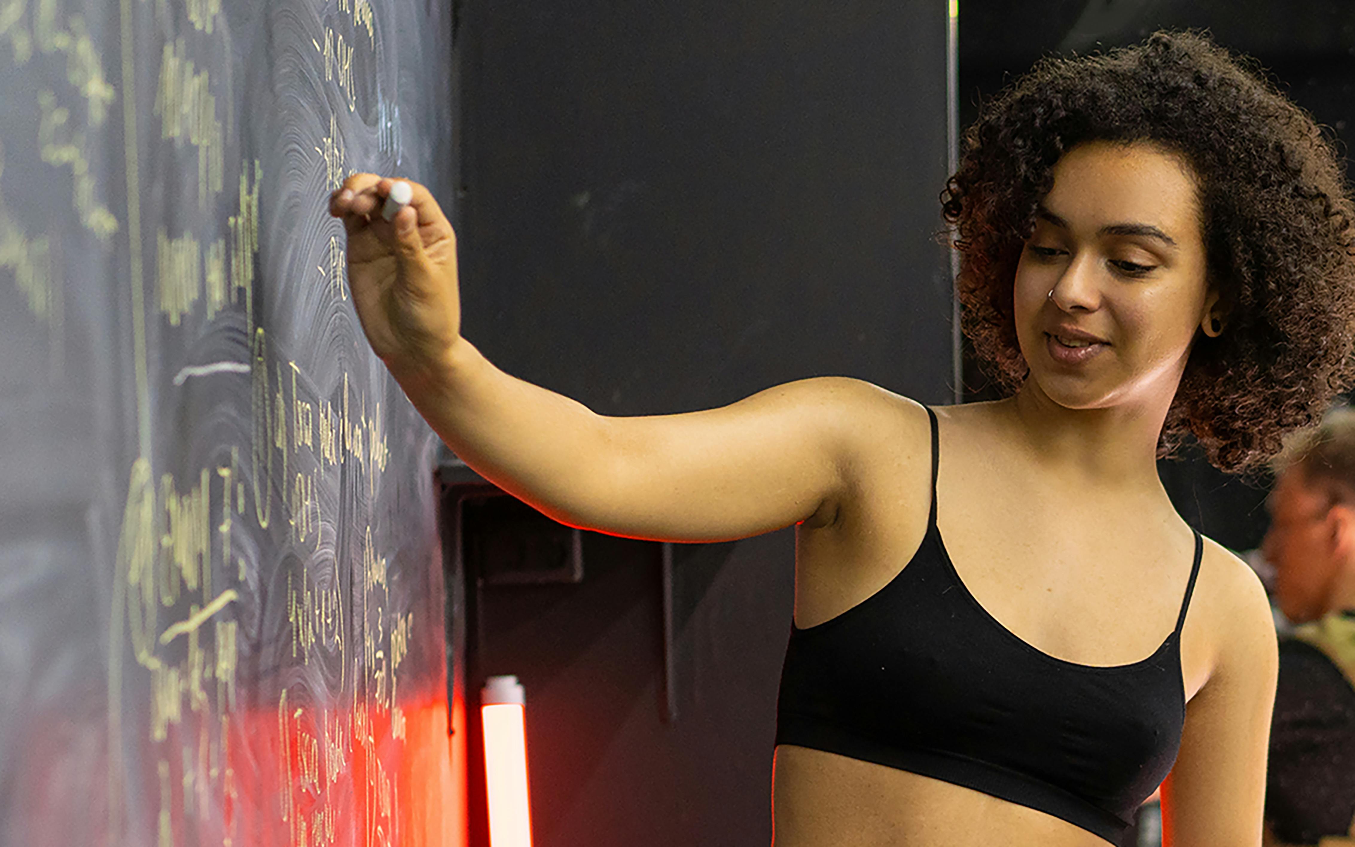 Woman in Black Spaghetti Strap Crop Top · Free Stock Photo