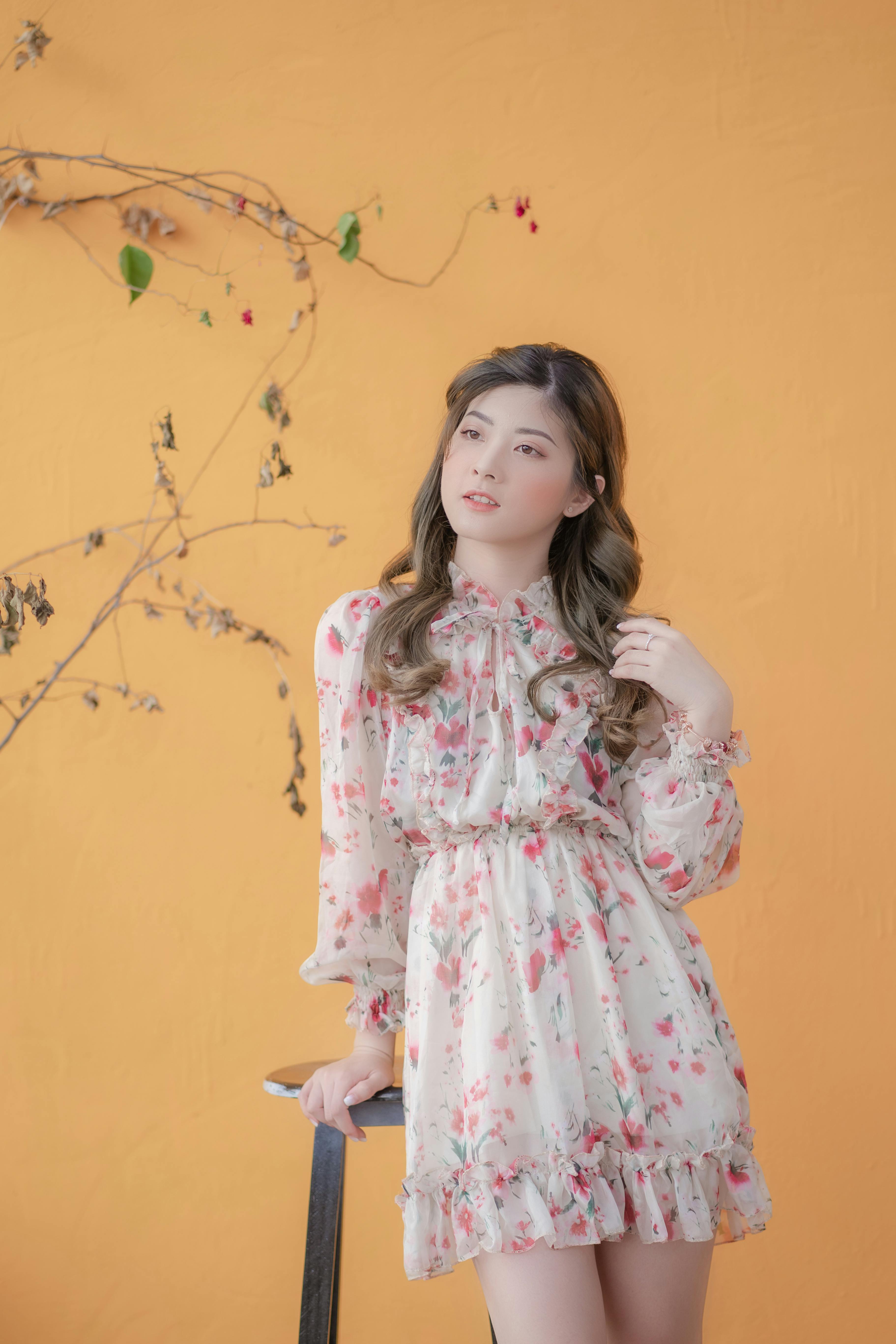 Beautiful Women Leaning Back to Back · Free Stock Photo