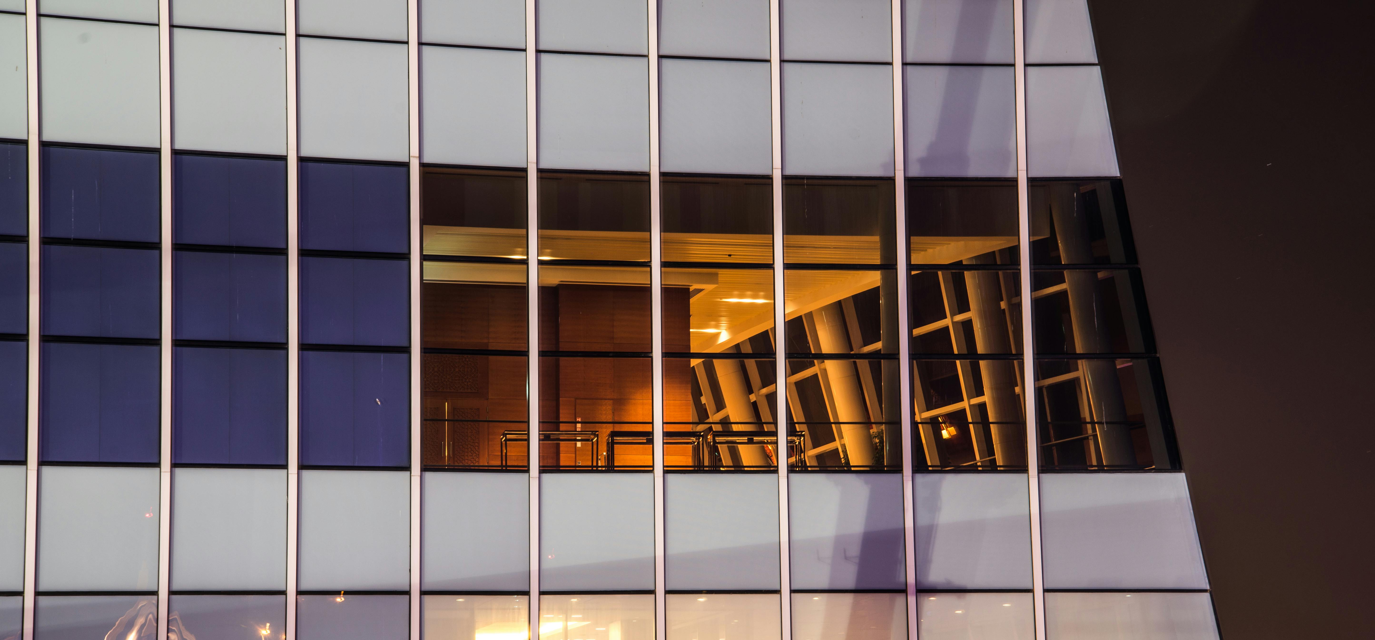 White and Blue Glass Window High Rise Building · Free Stock Photo