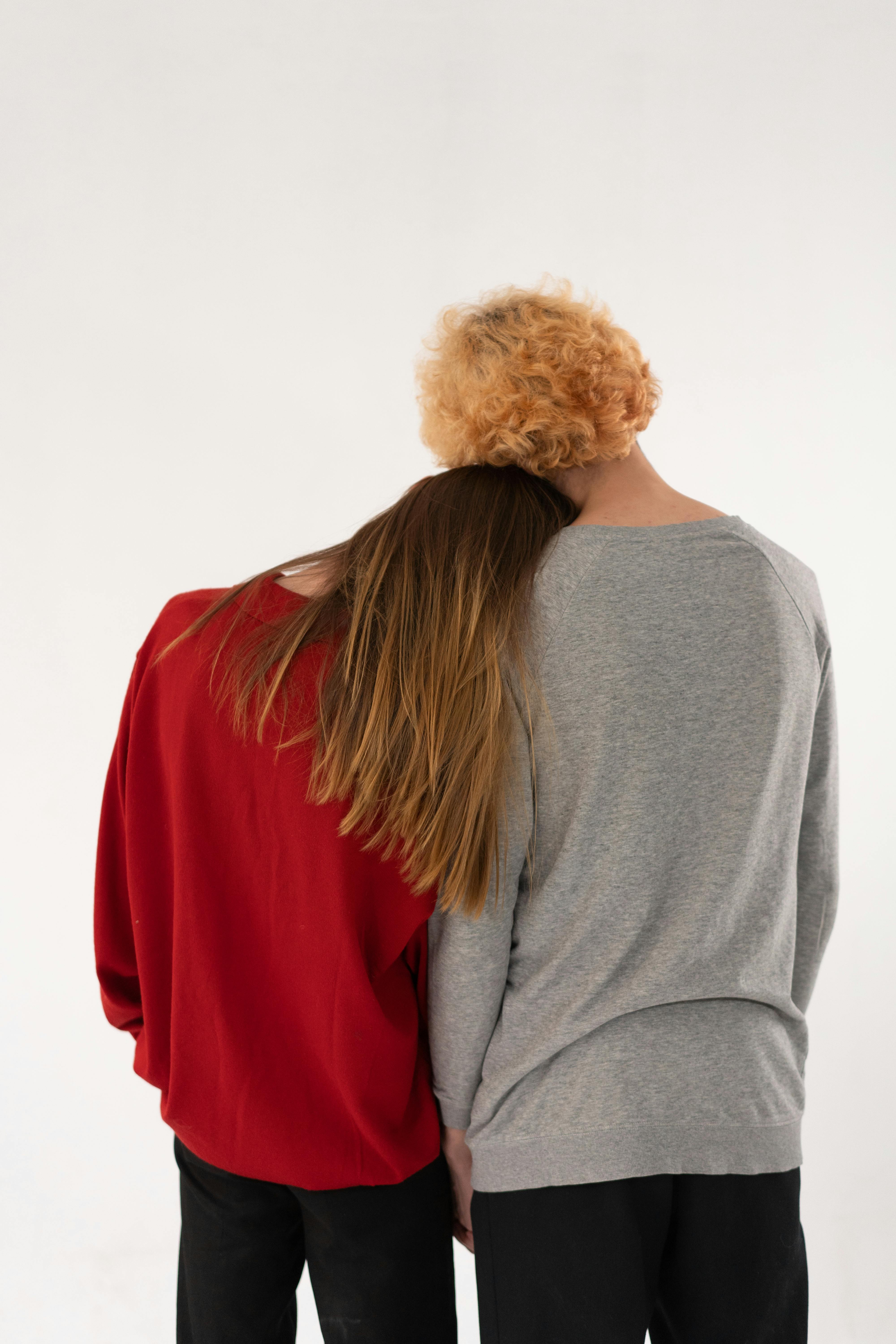 A Couple Leaning on Each Other · Free Stock Photo