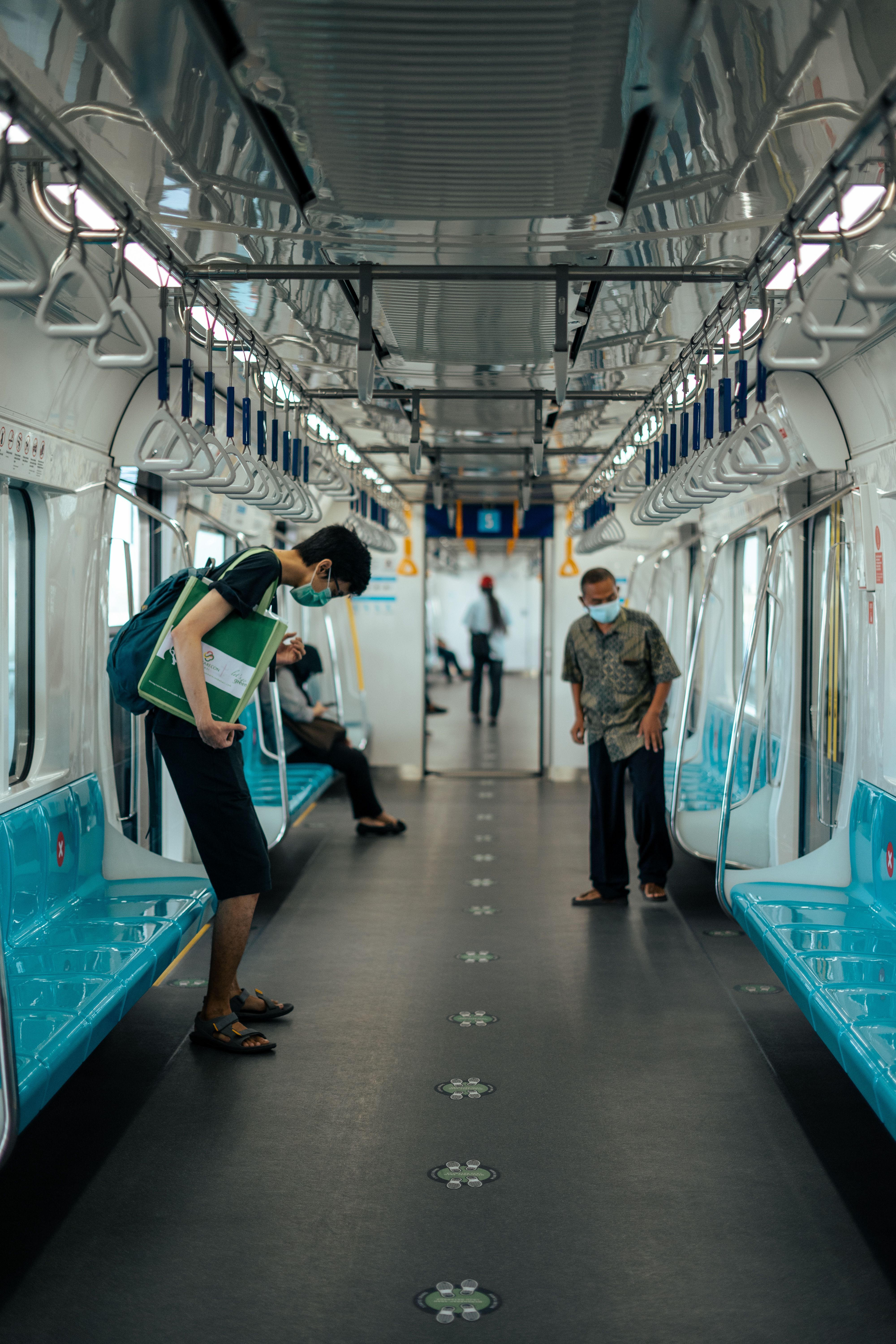 Passengers Commuting in a Train · Free Stock Photo