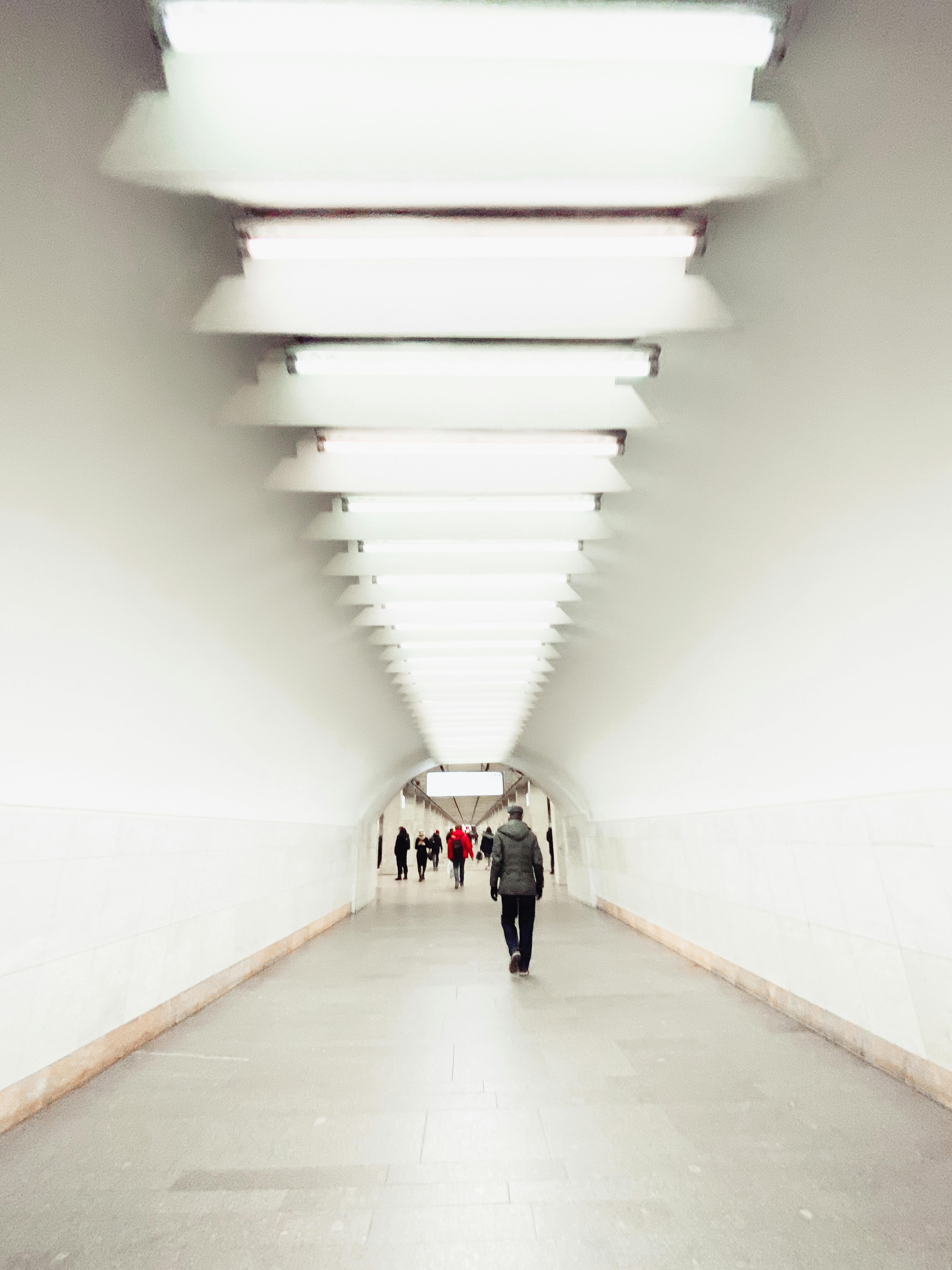 People Walking on Hallway · Free Stock Photo