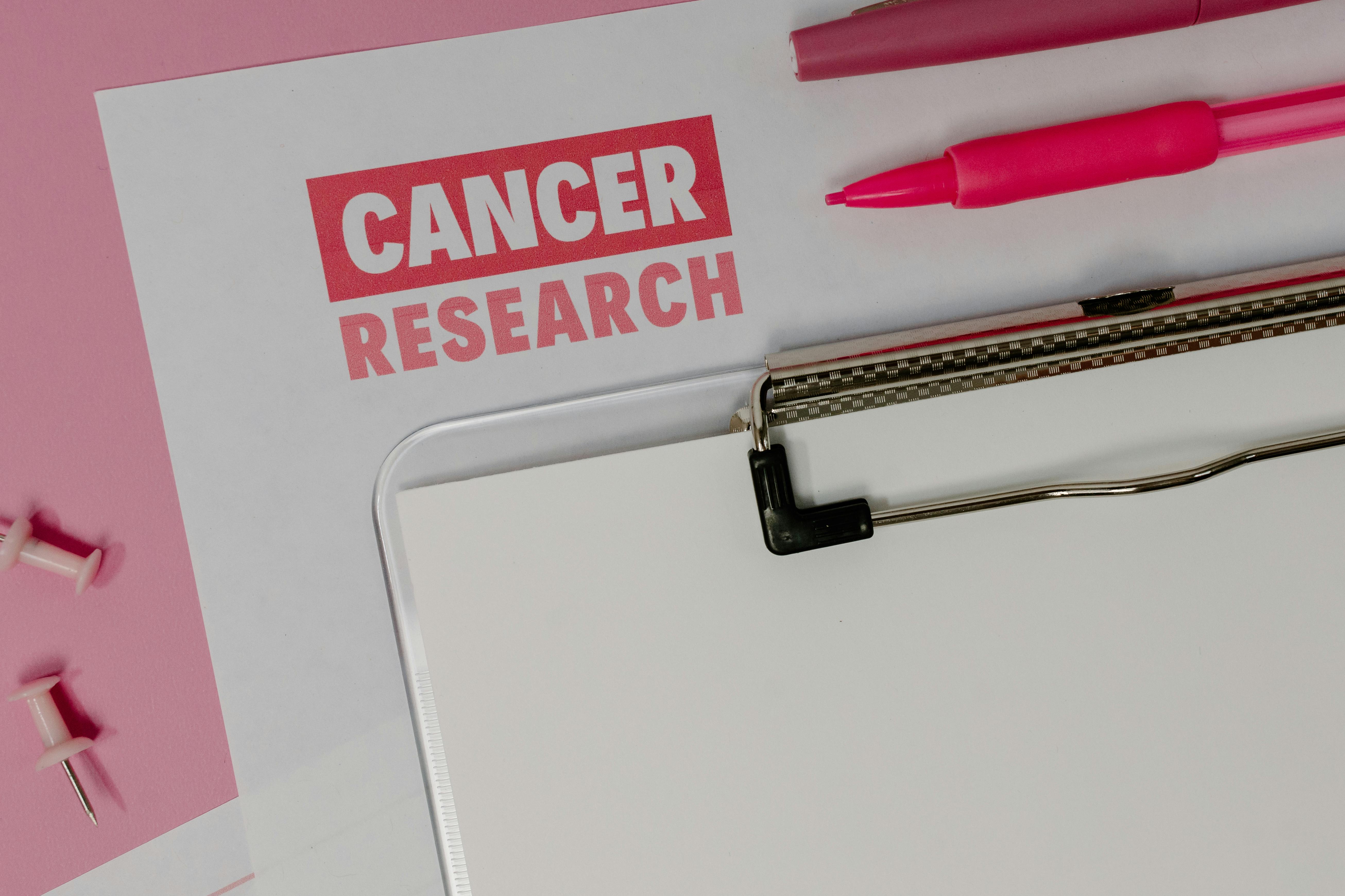 A Clipboard on Cancer Research Paper · Free Stock Photo