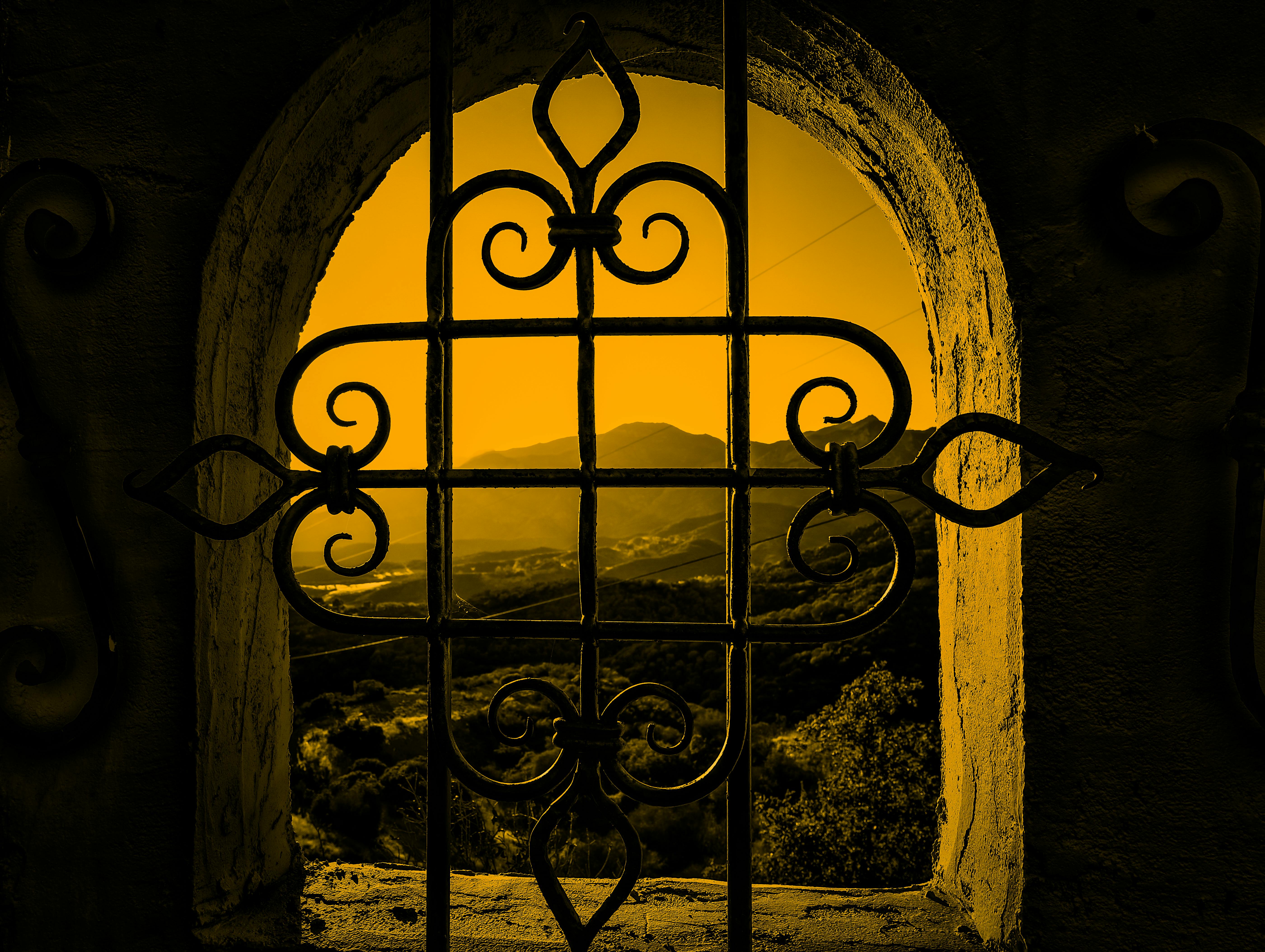 Free stock photo of Mountain view through a window