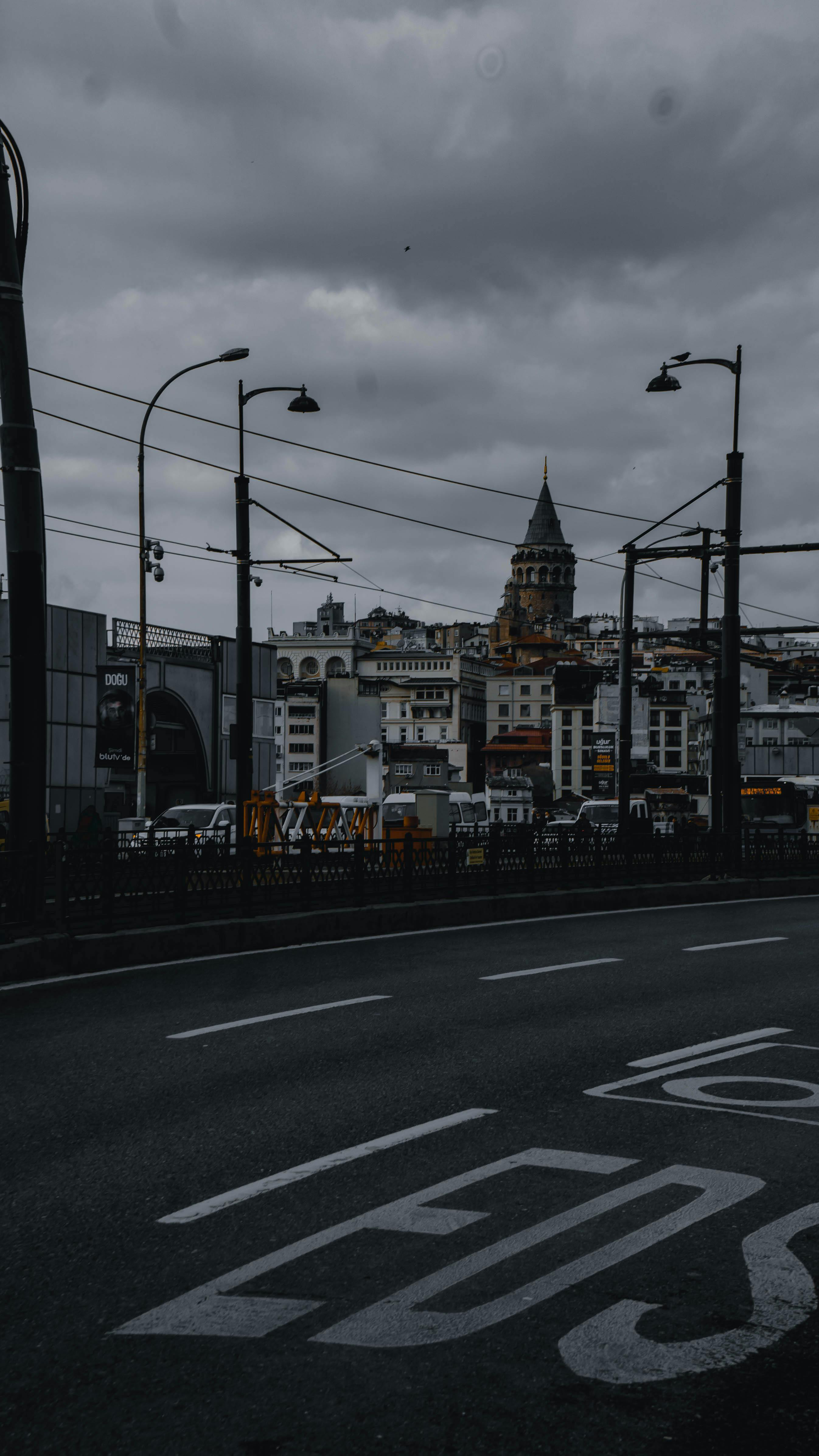Street Lights Illuminating a Dark Road at Night · Free Stock Photo