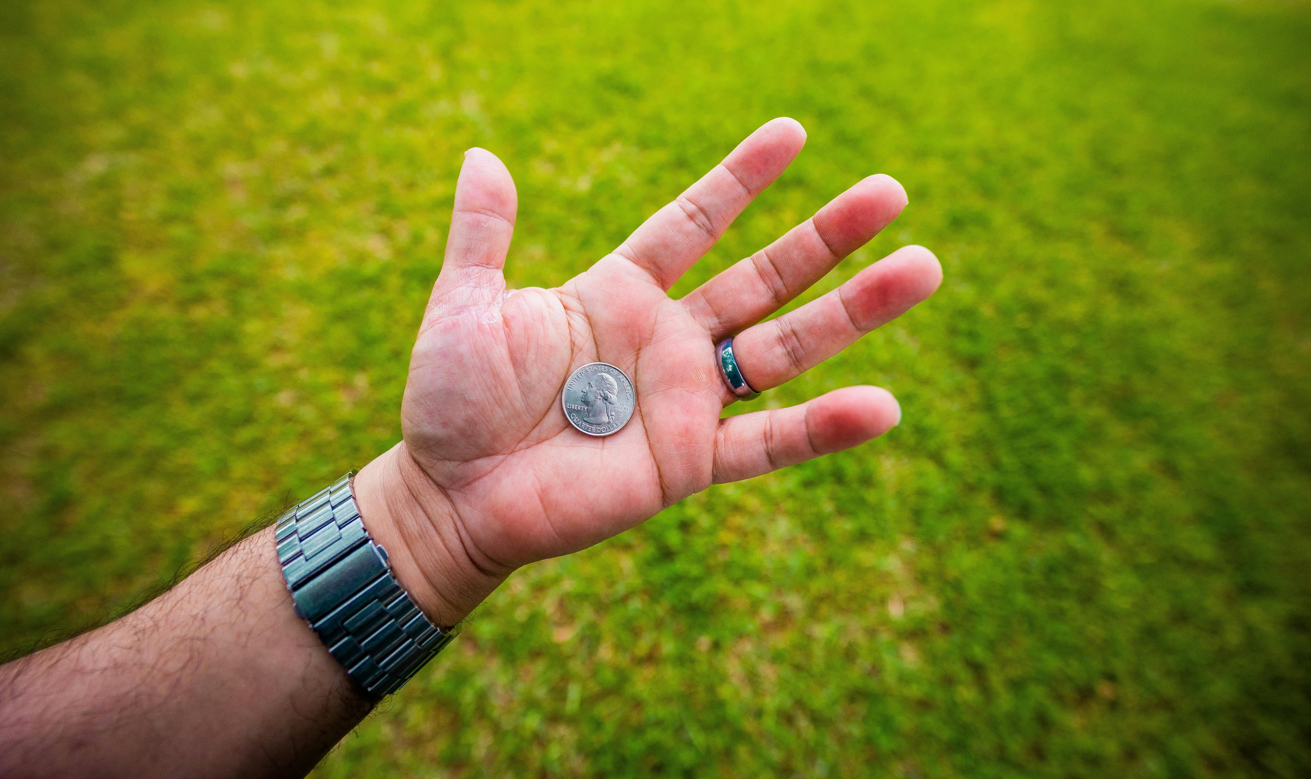 Silver Round Coin on Person's Hand · Free Stock Photo