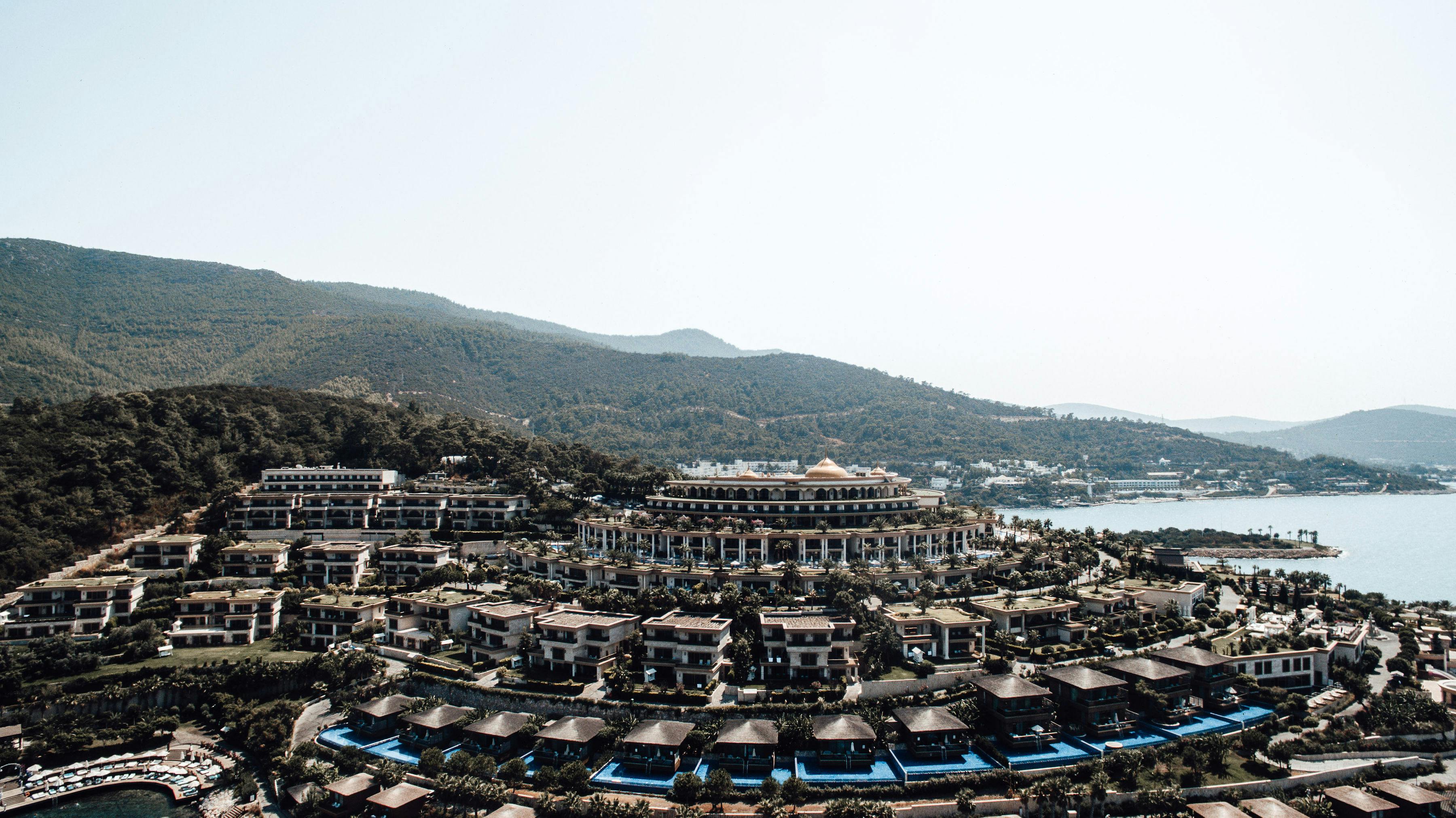 Scenic Photo of City Through Opened Window · Free Stock Photo