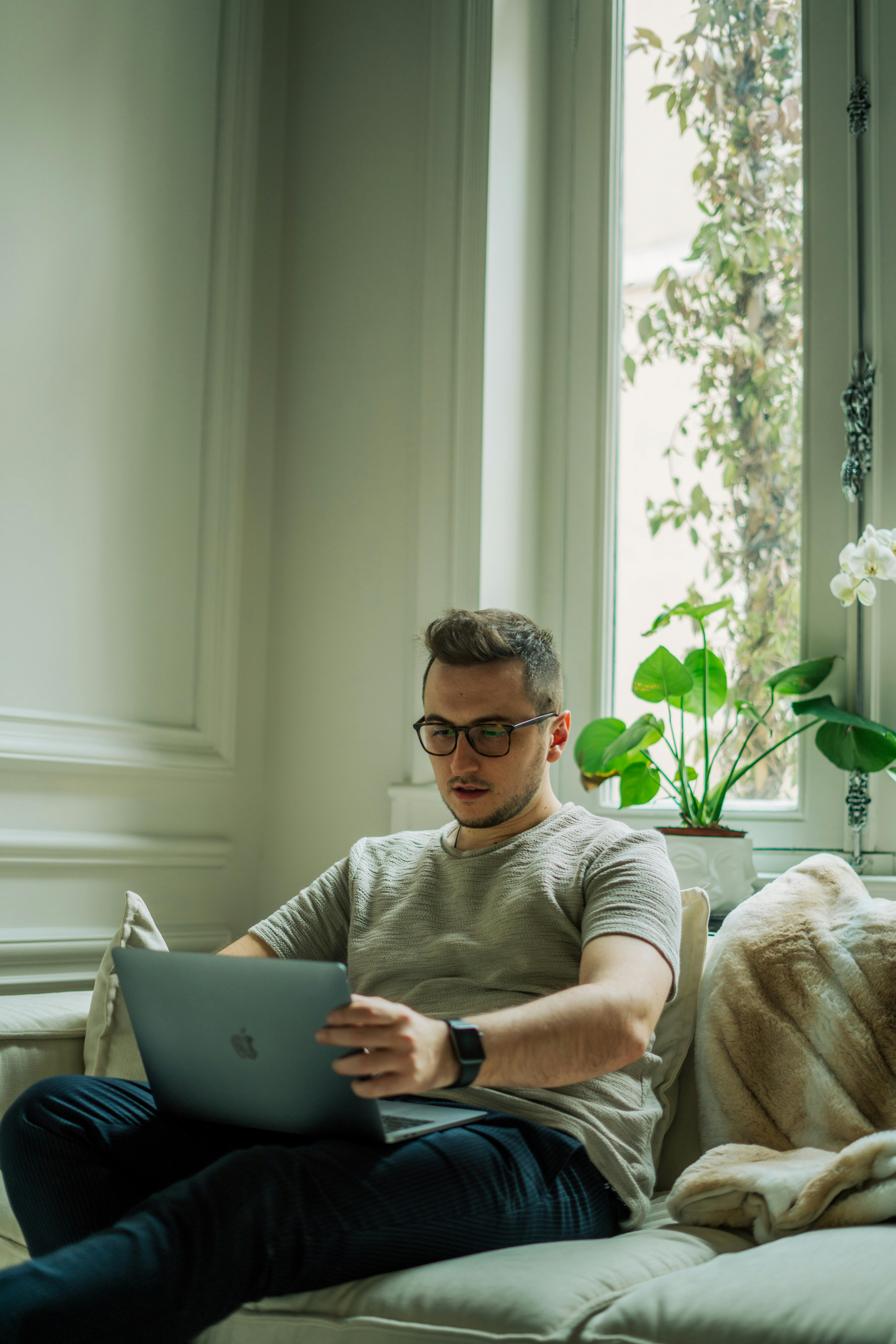 A Man Using a Laptop · Free Stock Photo