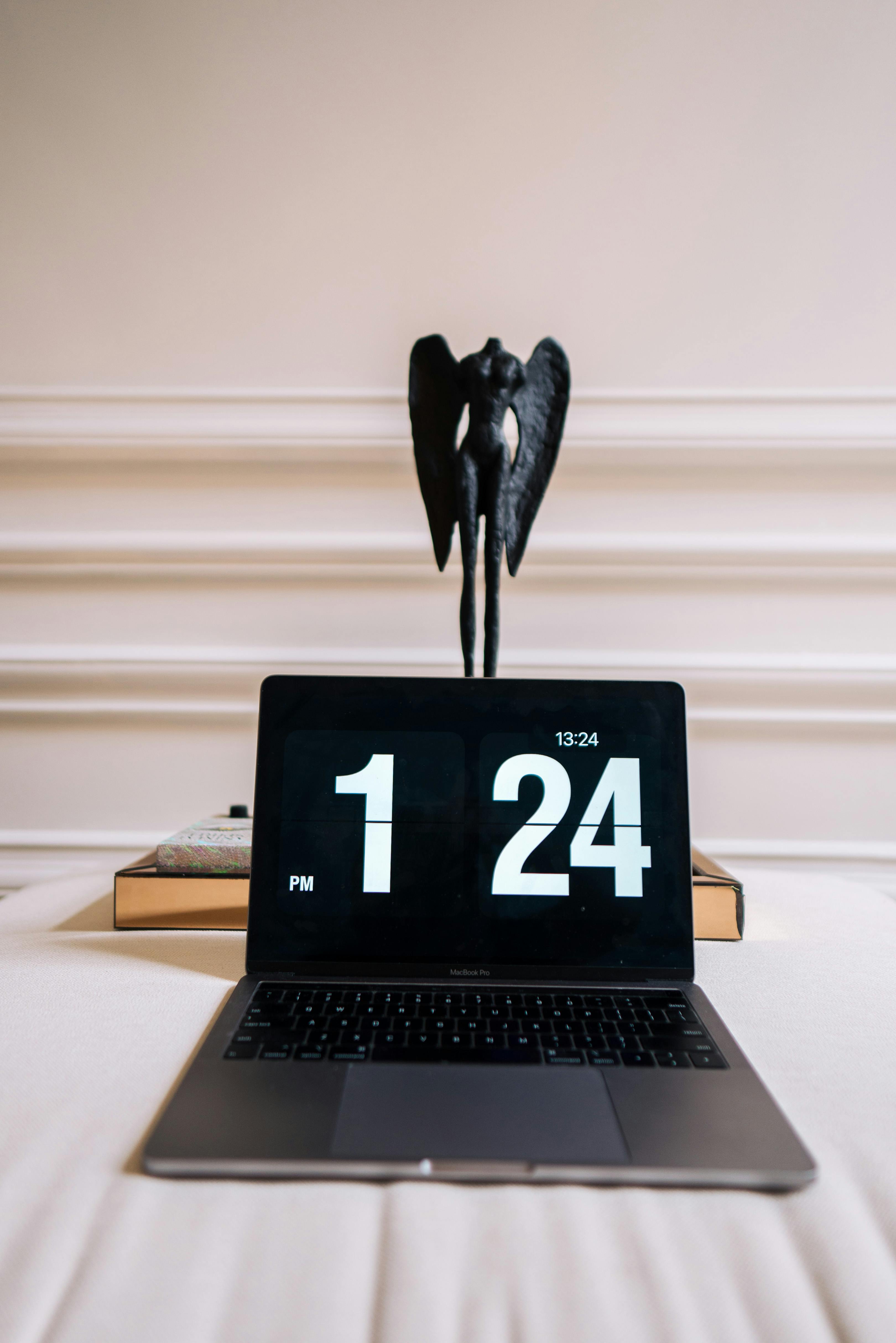 Laptop Display Showing Time · Free Stock Photo