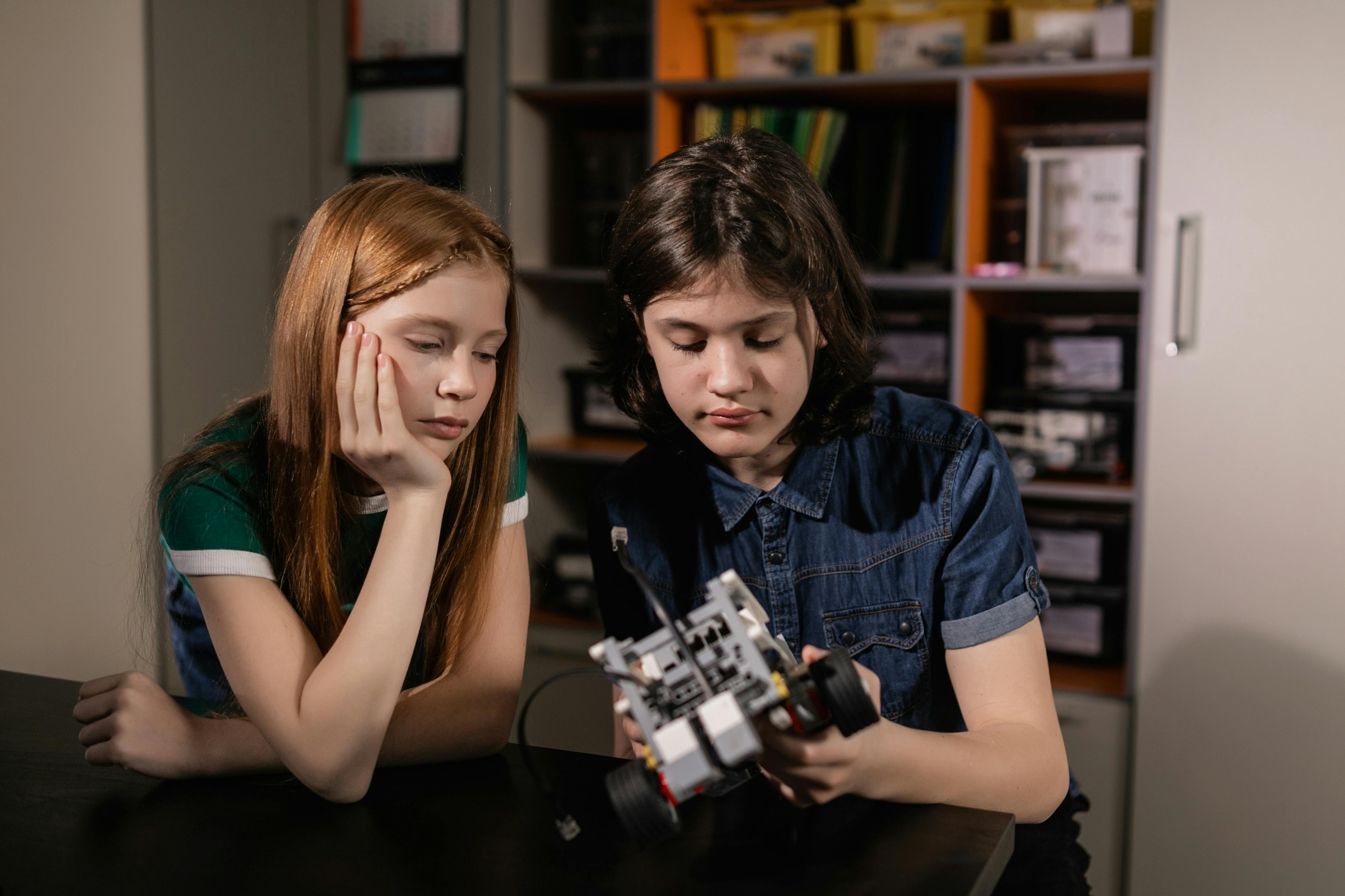 Girls Studying the Lego Education Spike Prime · Free Stock Photo