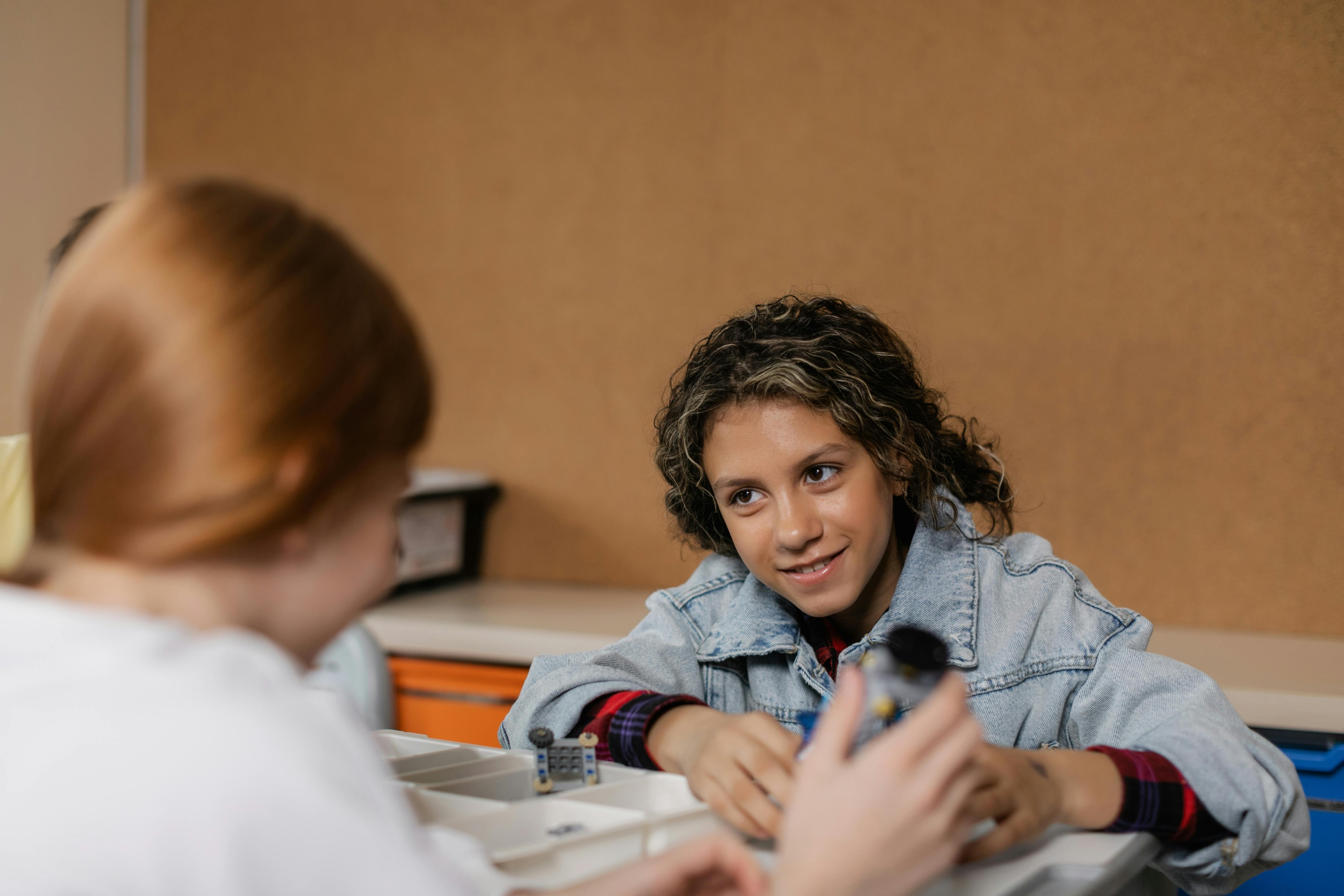 Students Sitting Around A Table Photos, Download The BEST Free Students ...