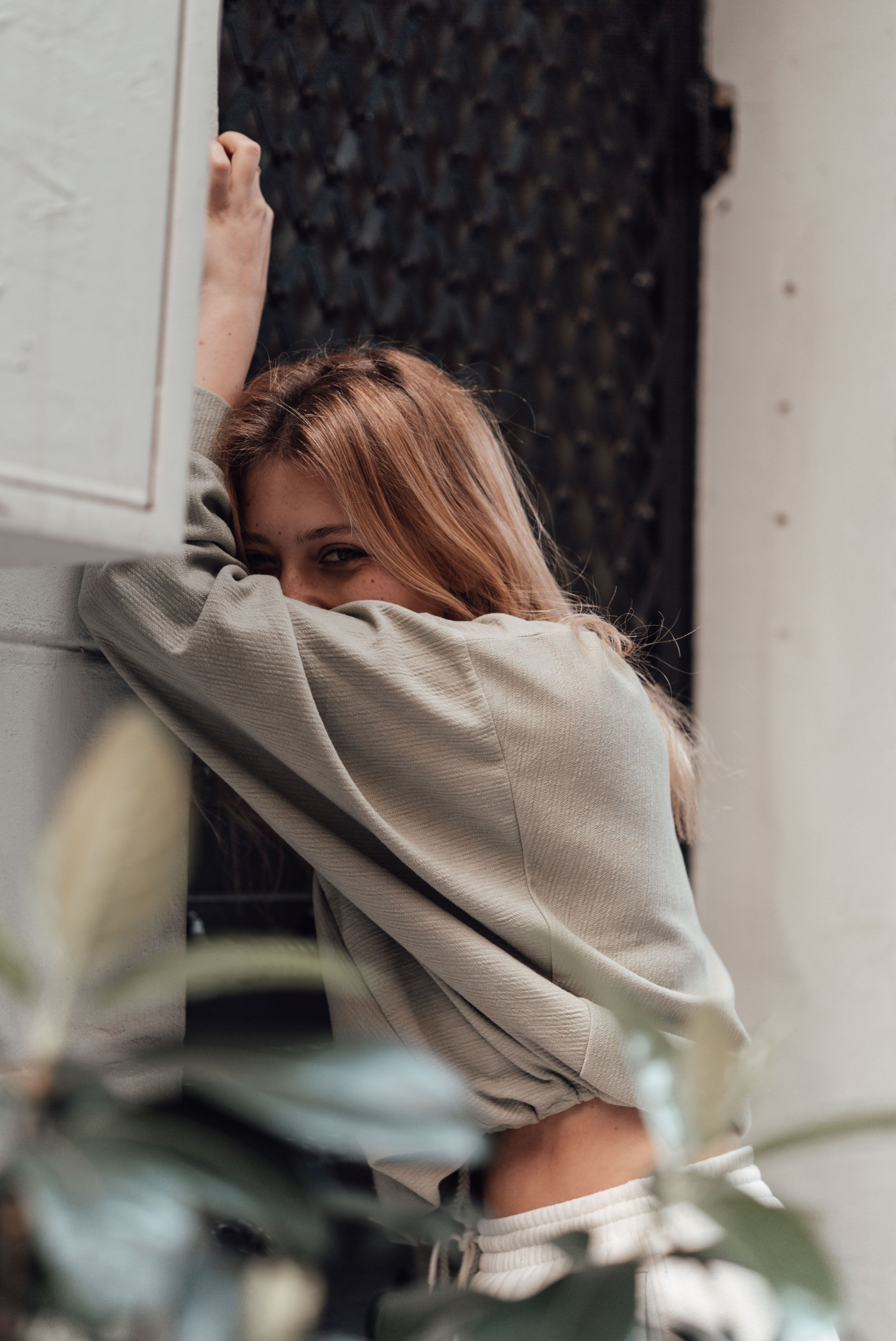 A Woman Covering her Face with her Arm · Free Stock Photo