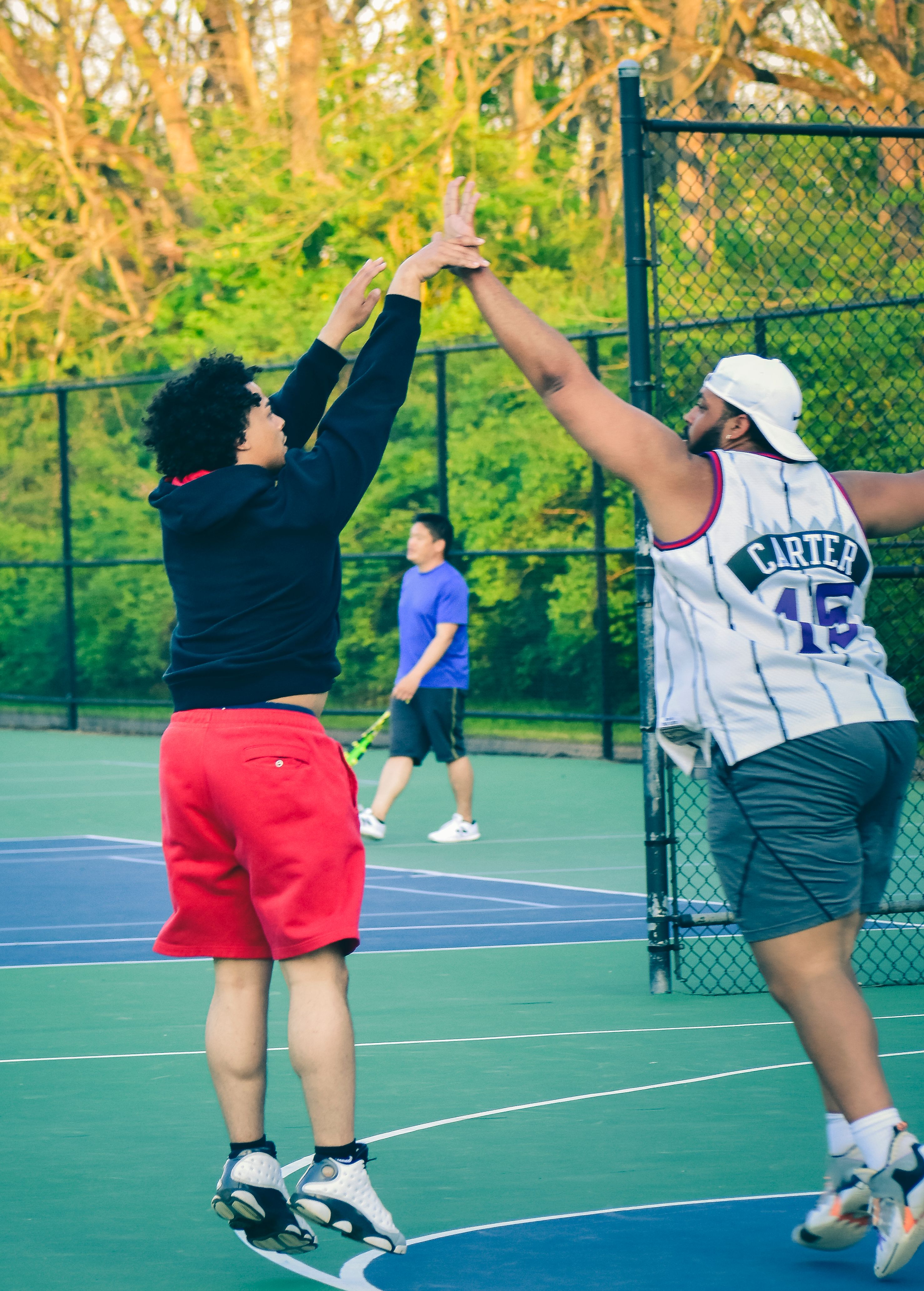 Friends Playing Basketball Together · Free Stock Photo