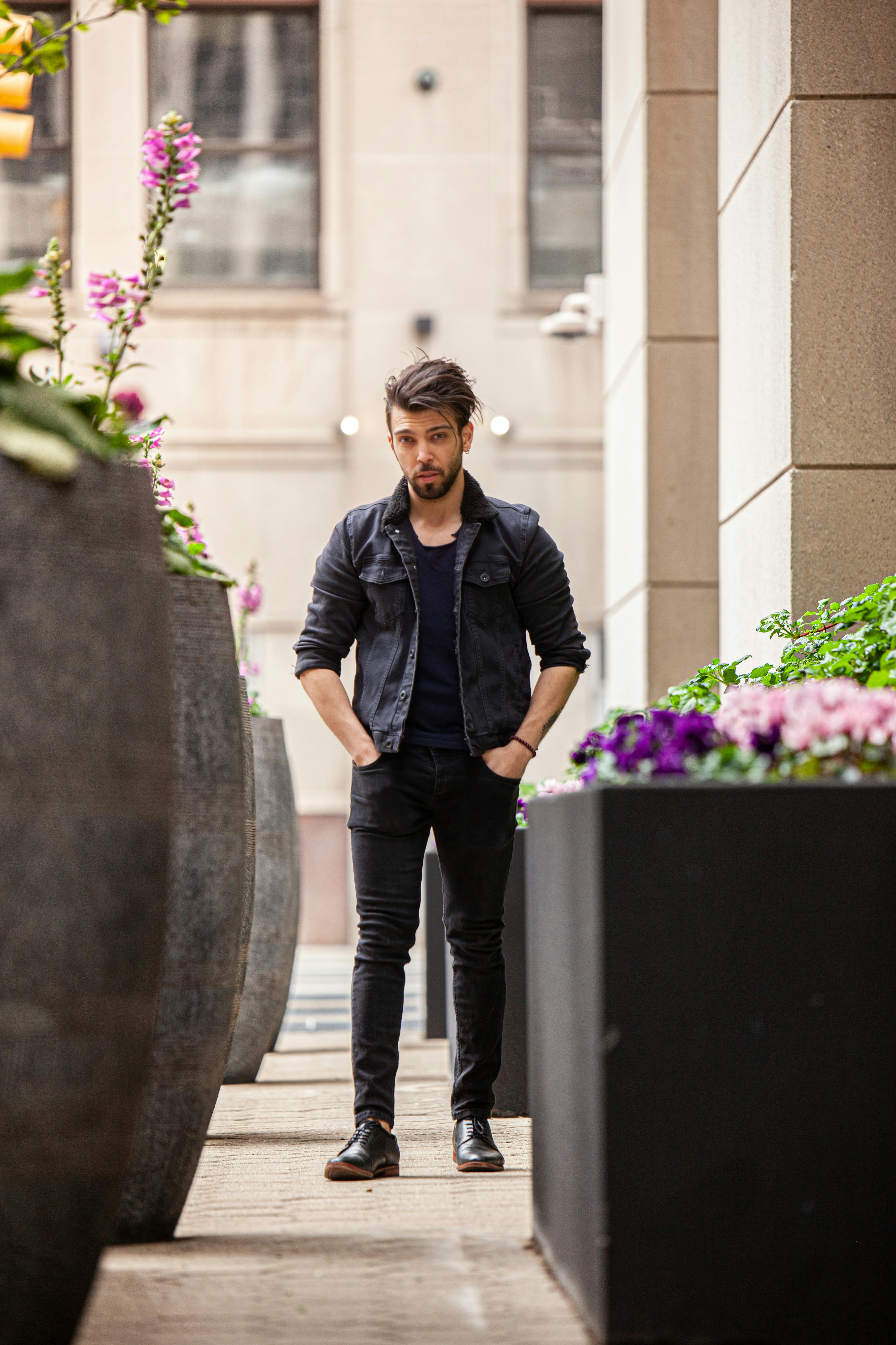 A Man Smiling while Looking Down · Free Stock Photo