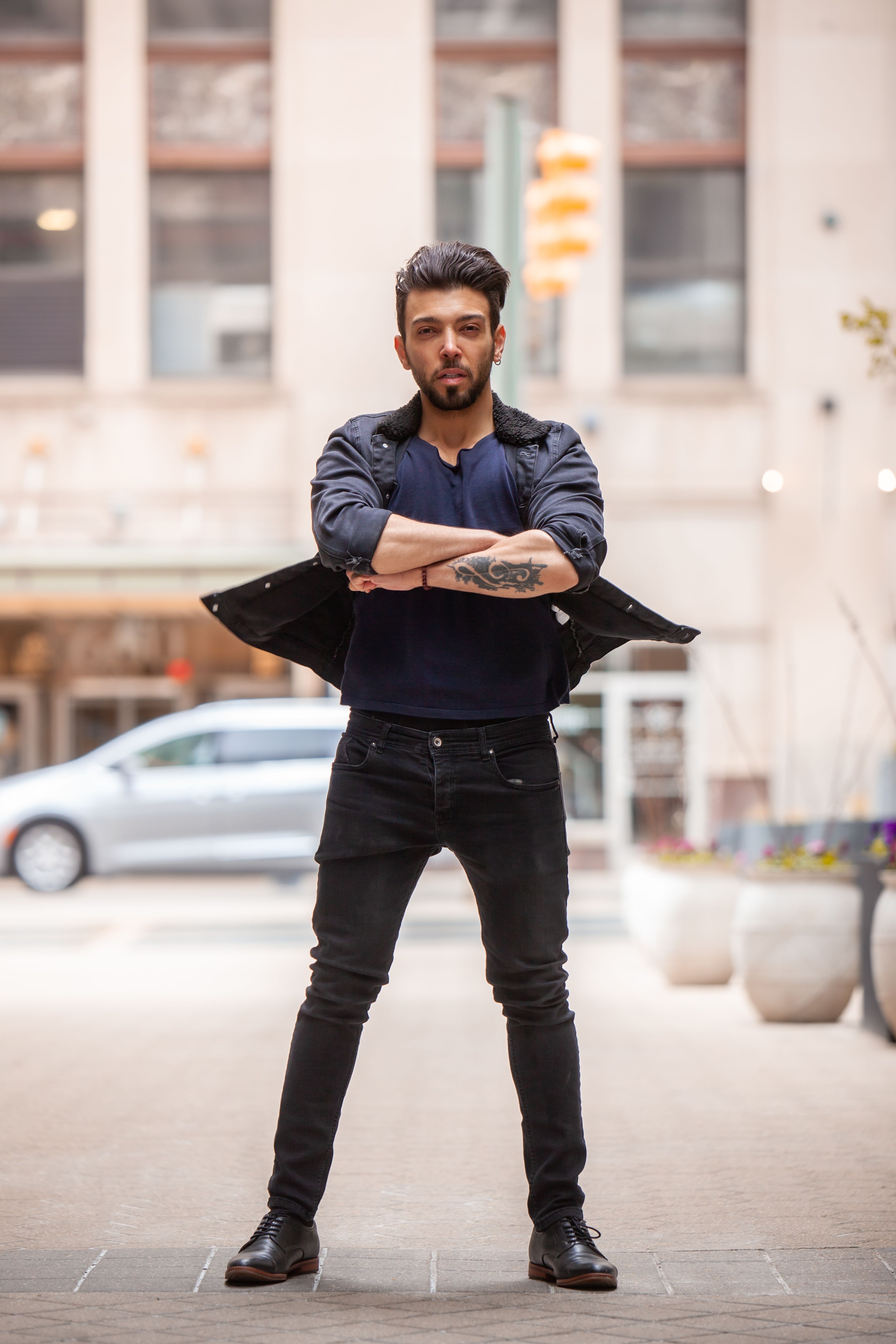 Man Wearing Jacket Standing on the Walkway · Free Stock Photo