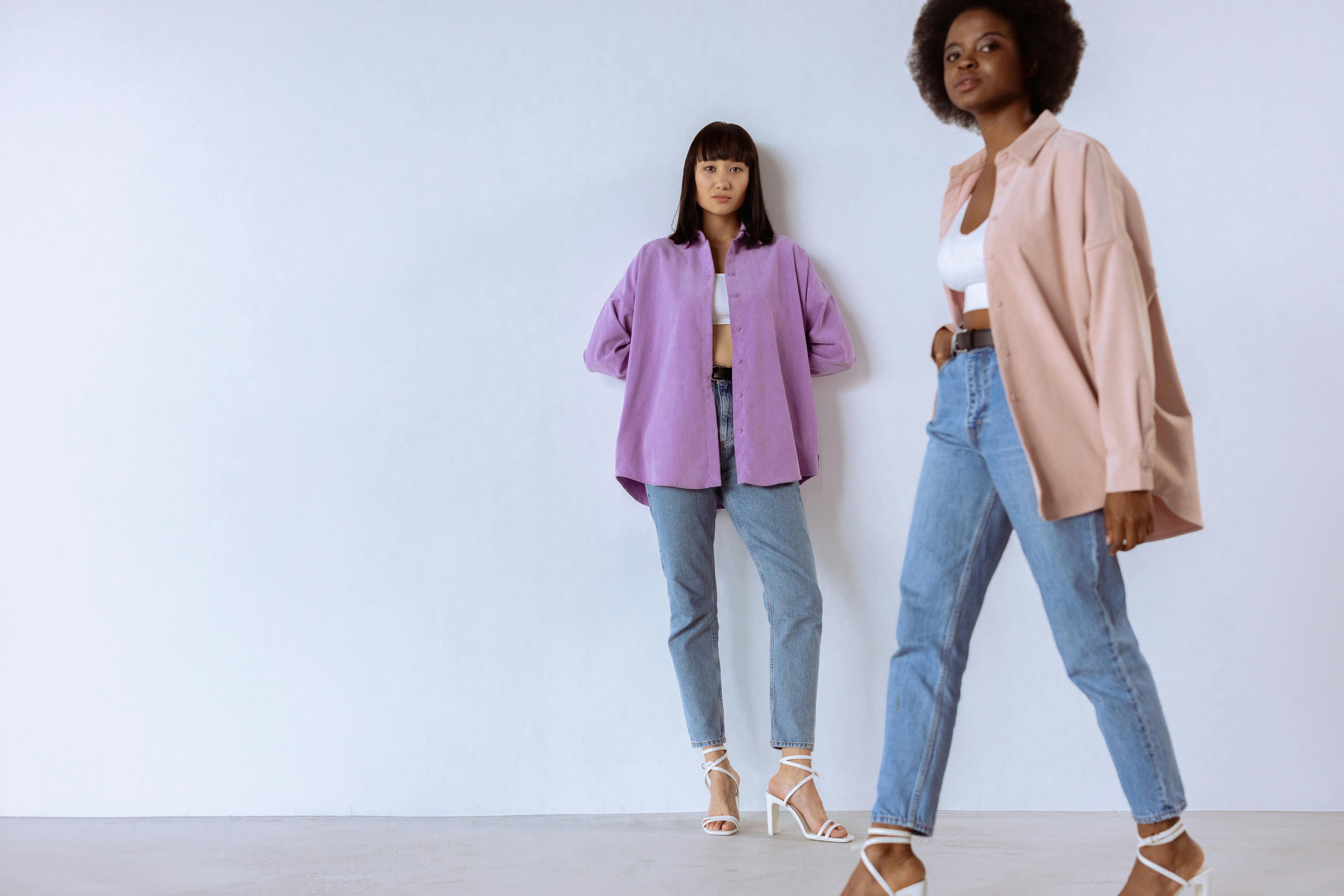 Woman Inside the Pile of Clothes · Free Stock Photo