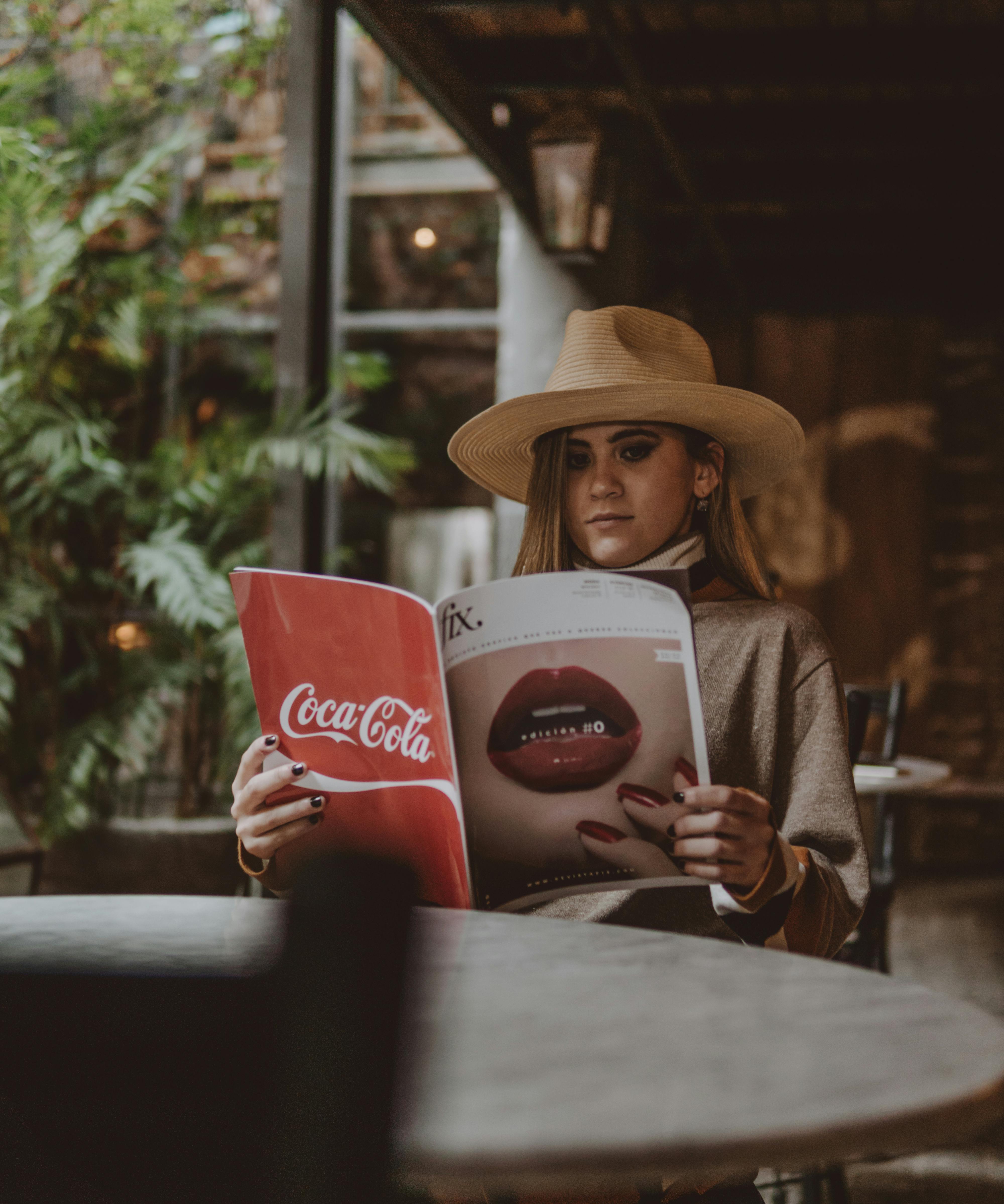 Woman Holding Playboy Magazine Cover · Free Stock Photo