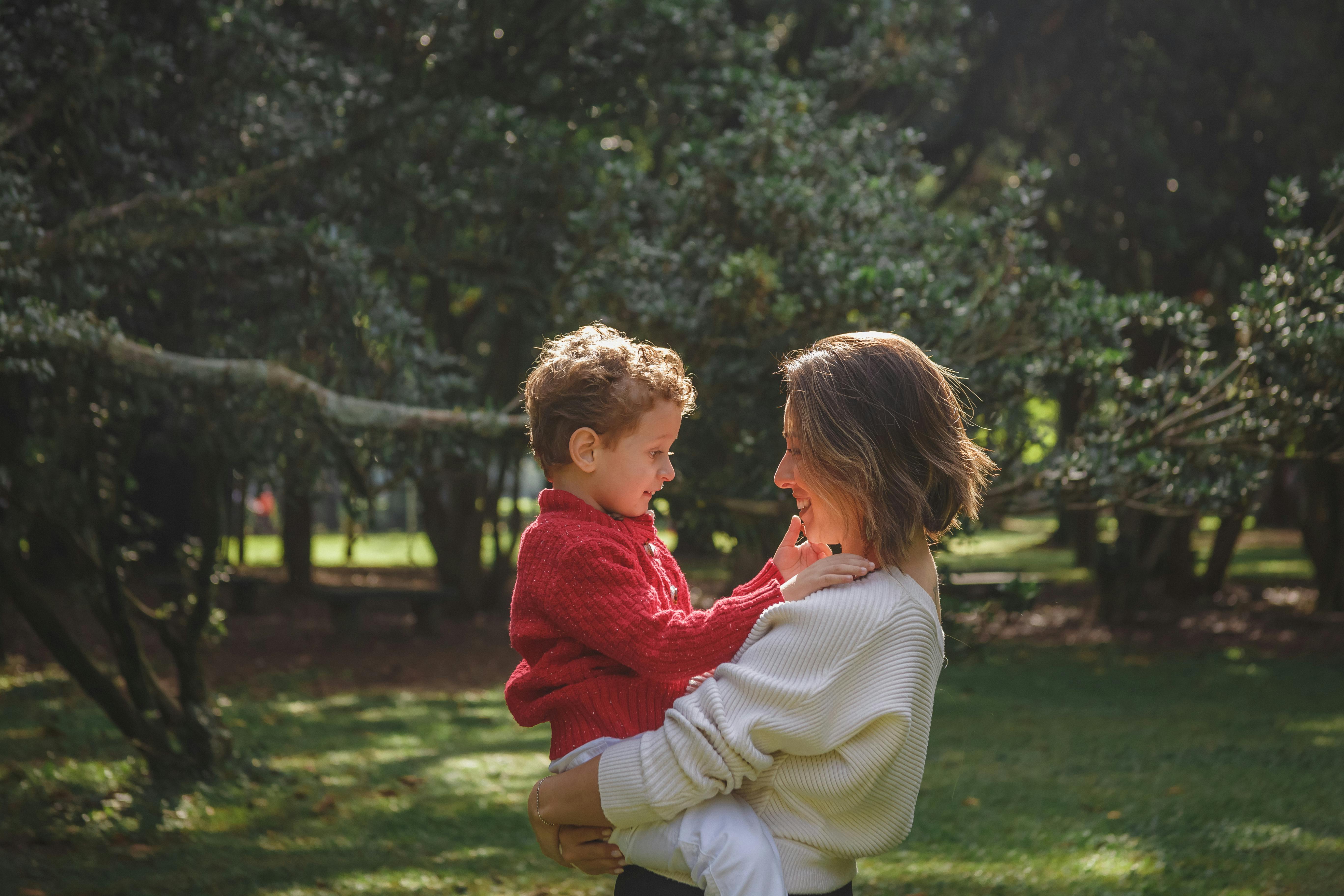 Woman Carrying Baby · Free Stock Photo