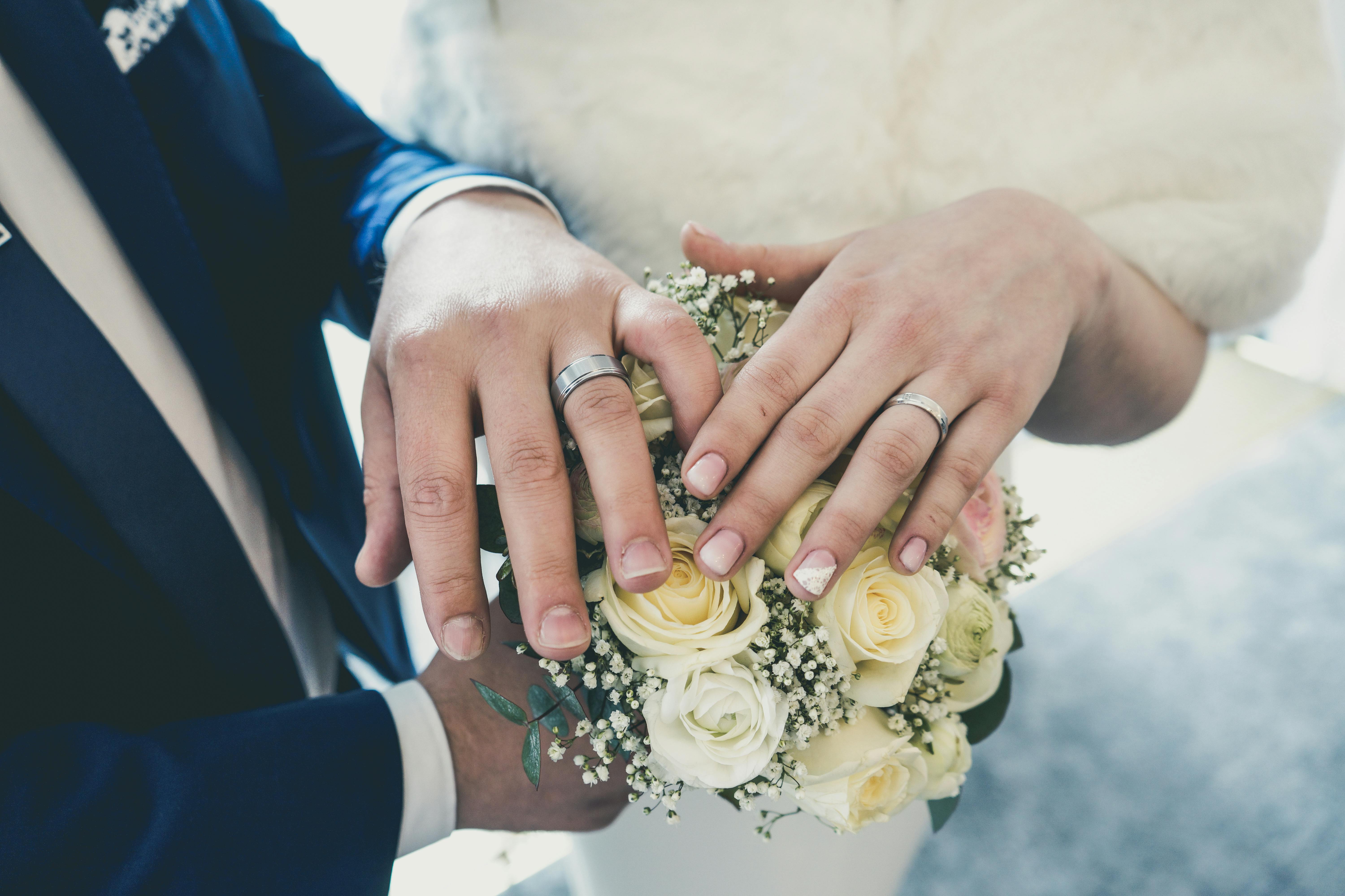 A Couple Wearing Their Rings · Free Stock Photo