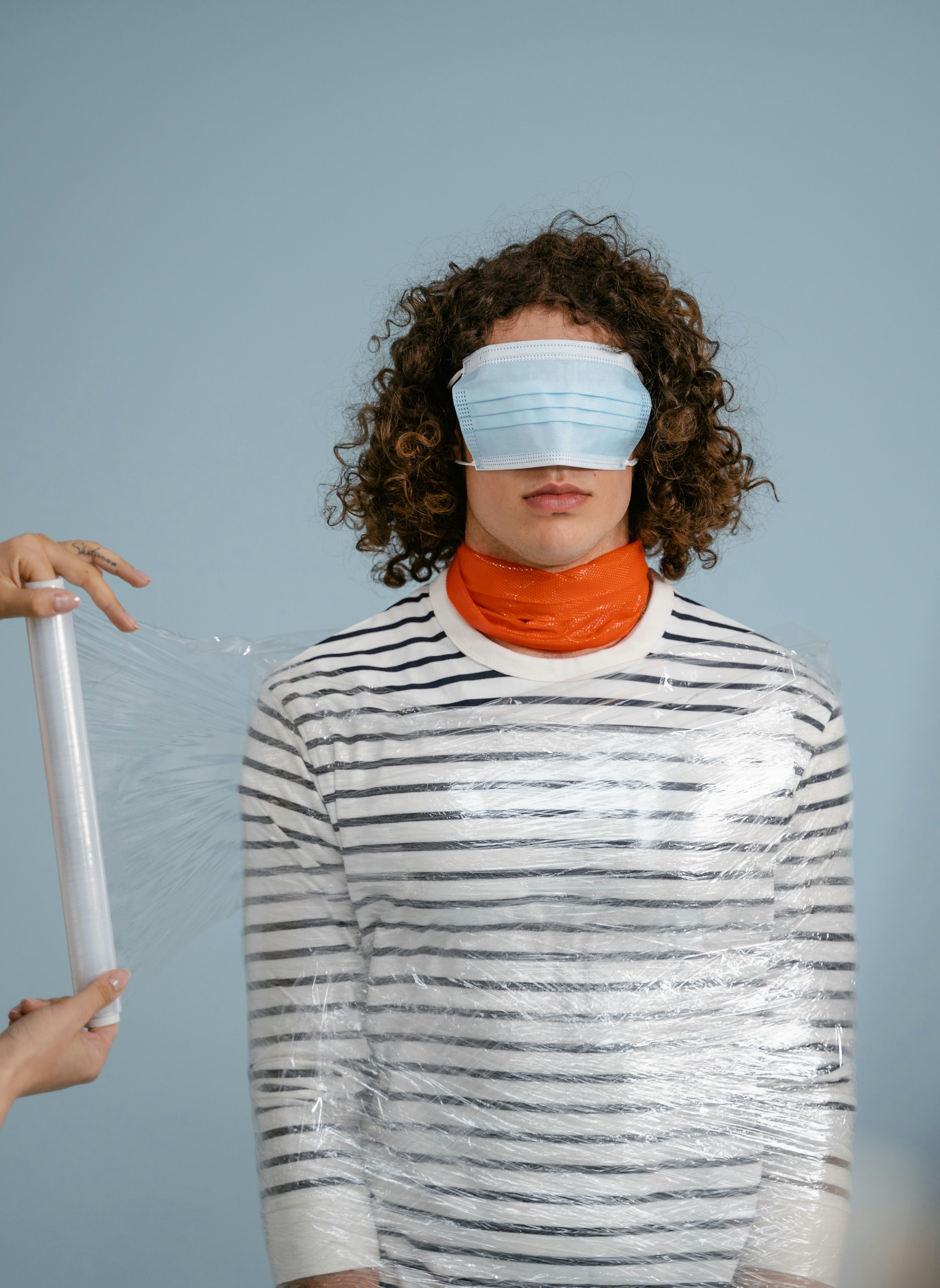 Person Wrapped in Foil · Free Stock Photo