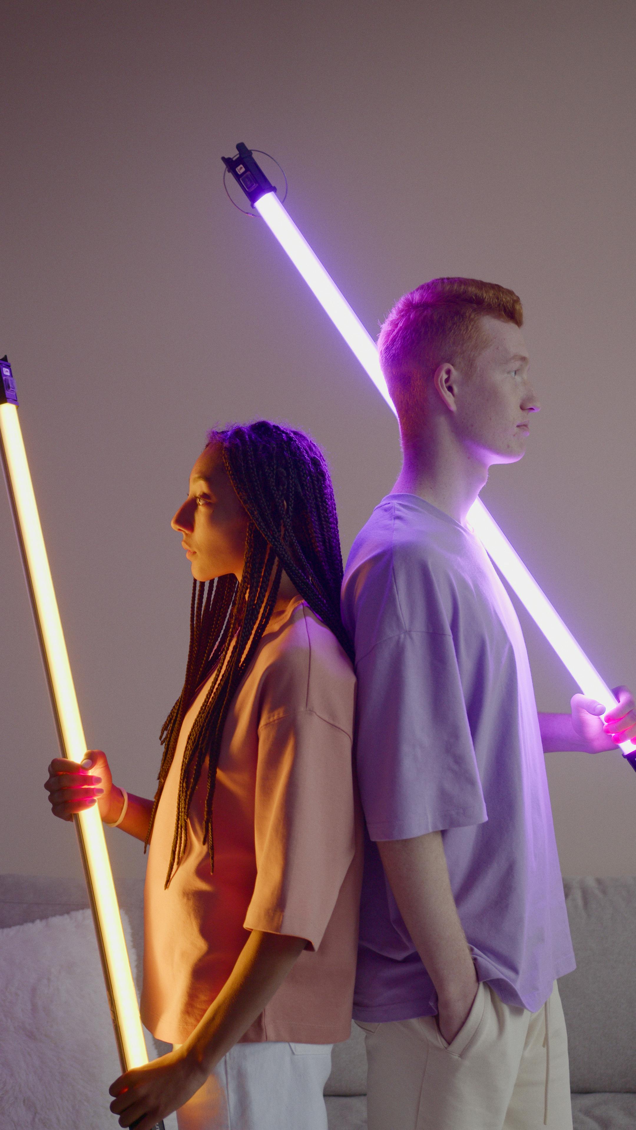 A Male Gamer Standing With A Phone In Backing The Camera Photos ...