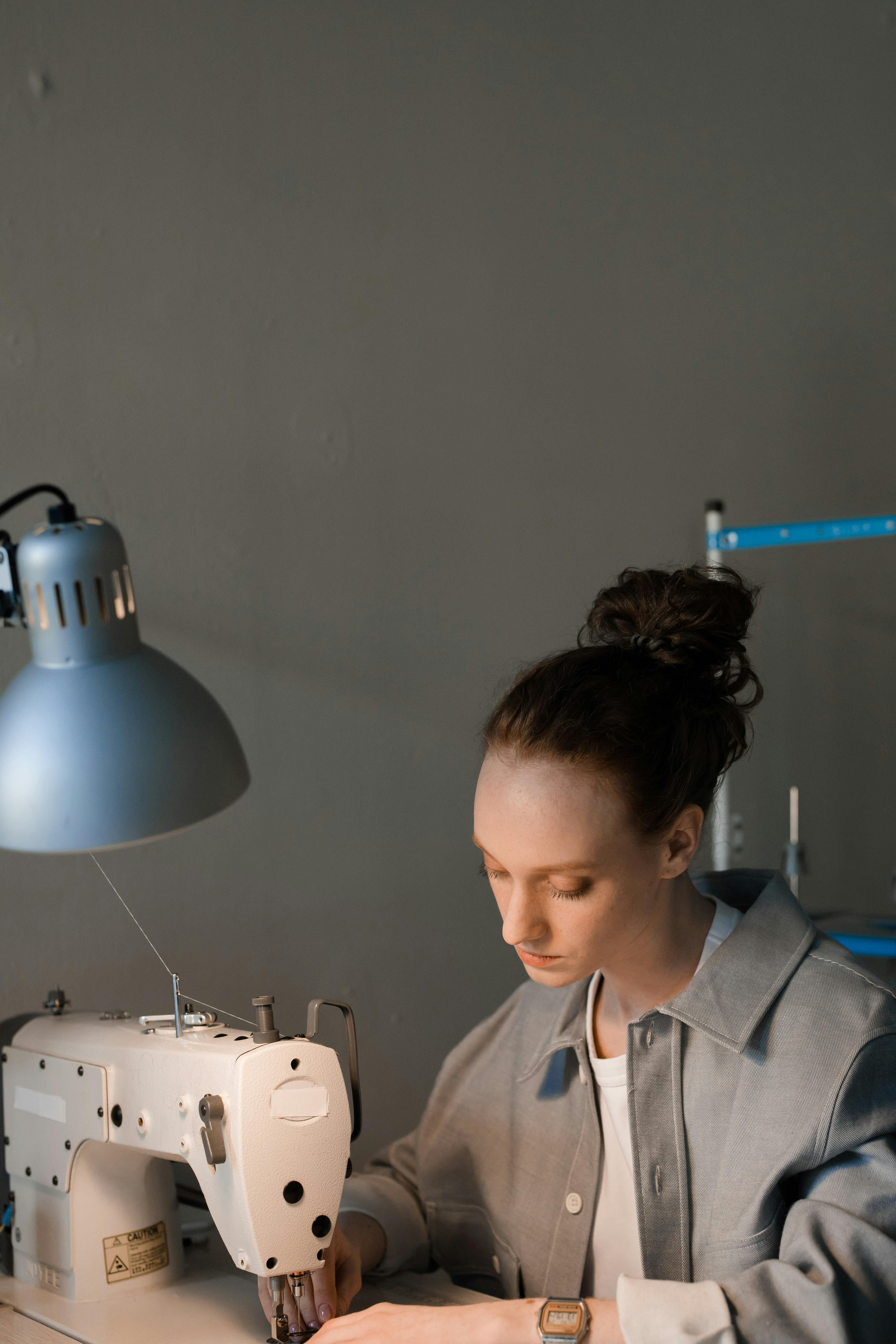 Photo of Woman Sewing · Free Stock Photo