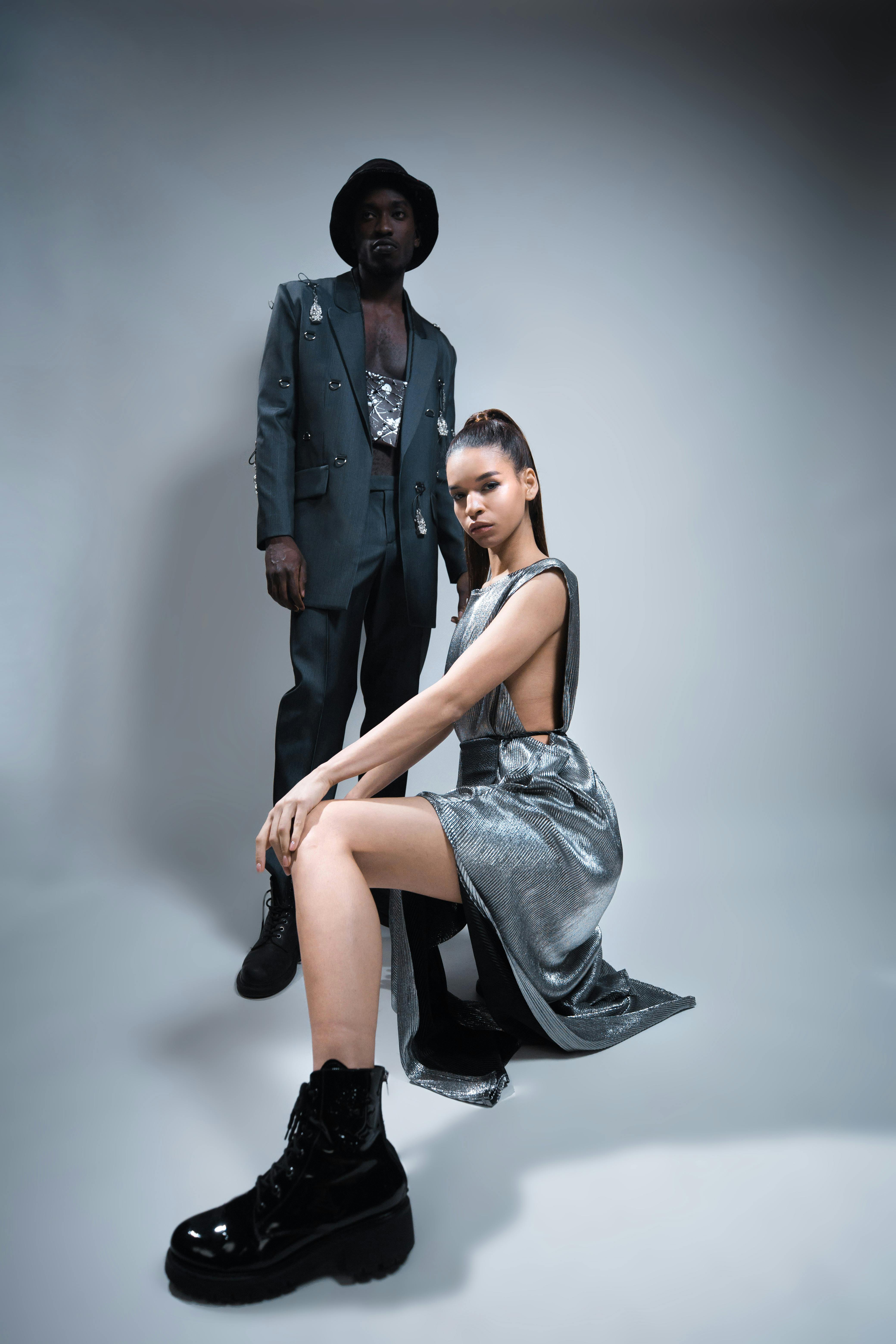 Woman and Man Modeling Fashion · Free Stock Photo