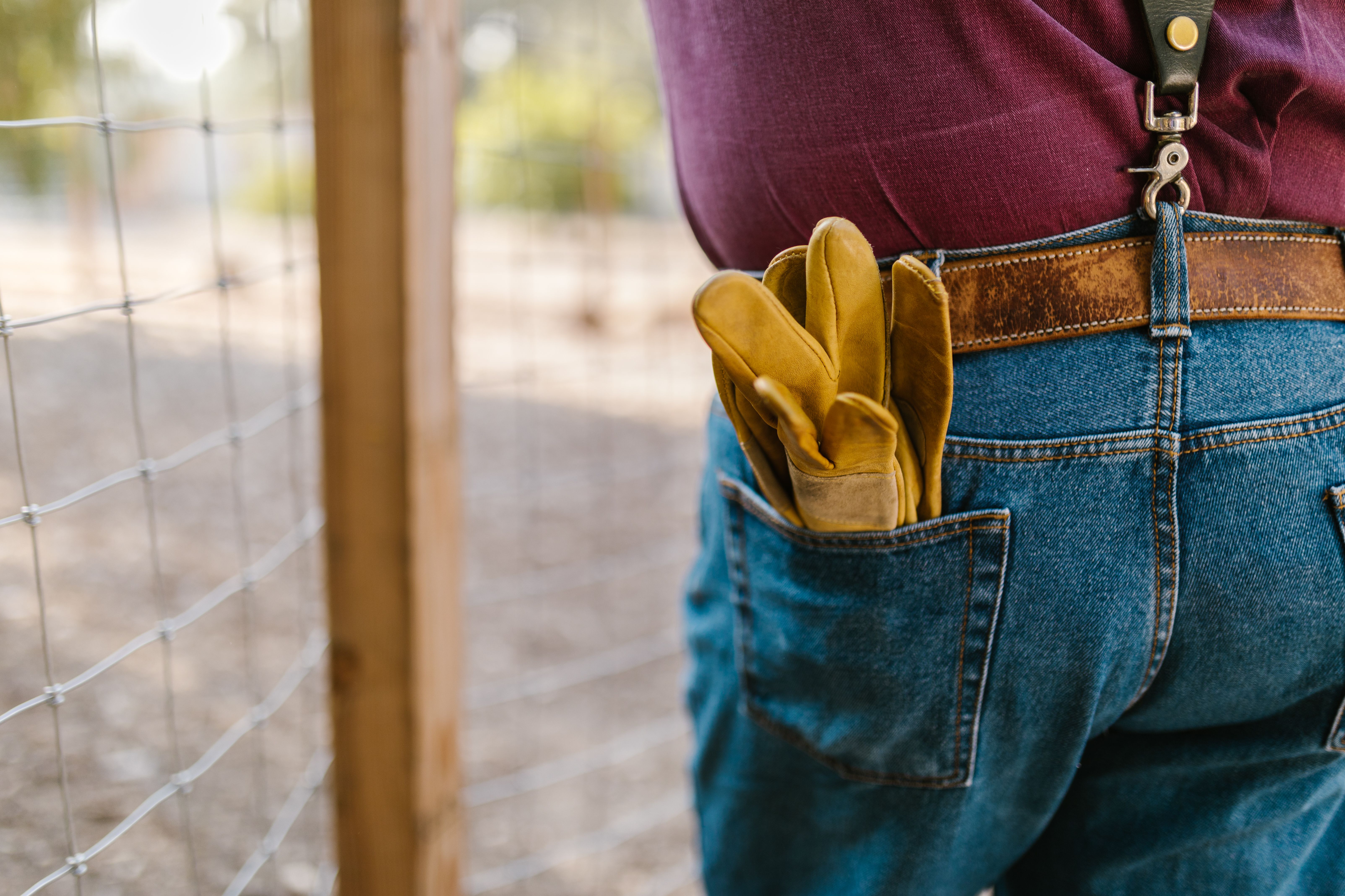 A Person Holding Yellow Pipes · Free Stock Photo