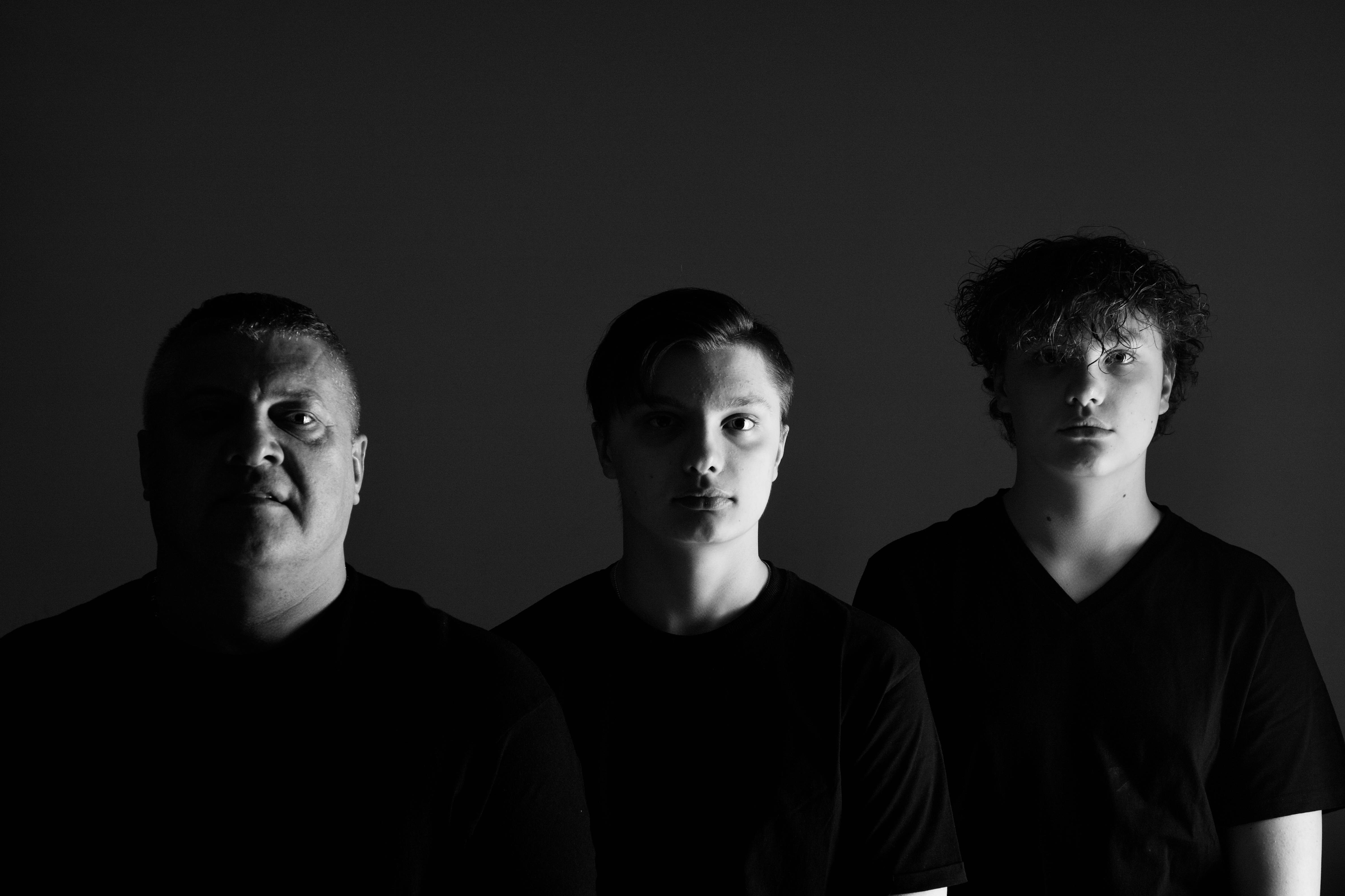 Three Man Standing in Shadow · Free Stock Photo