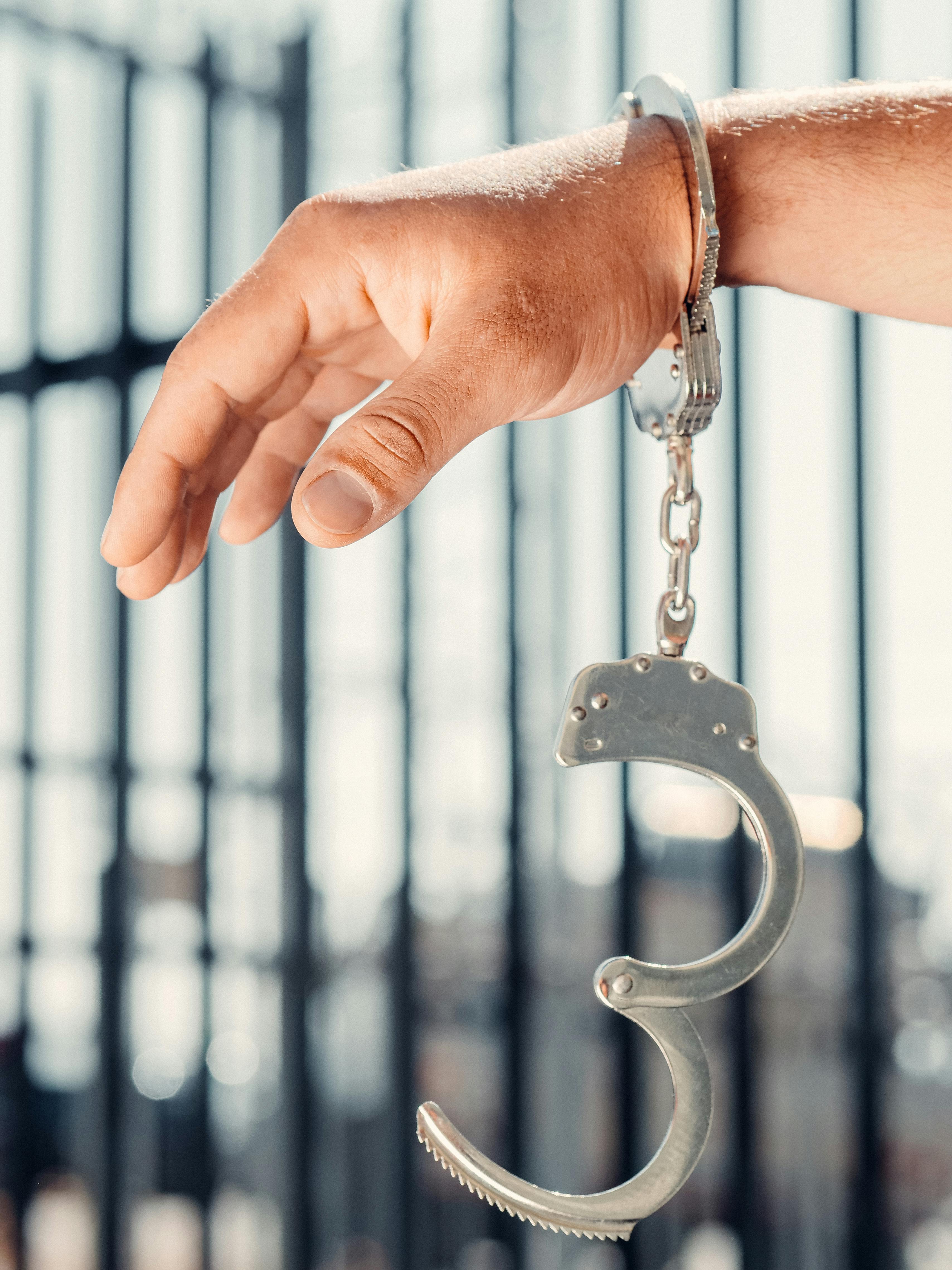 A Person in Handcuffs · Free Stock Photo