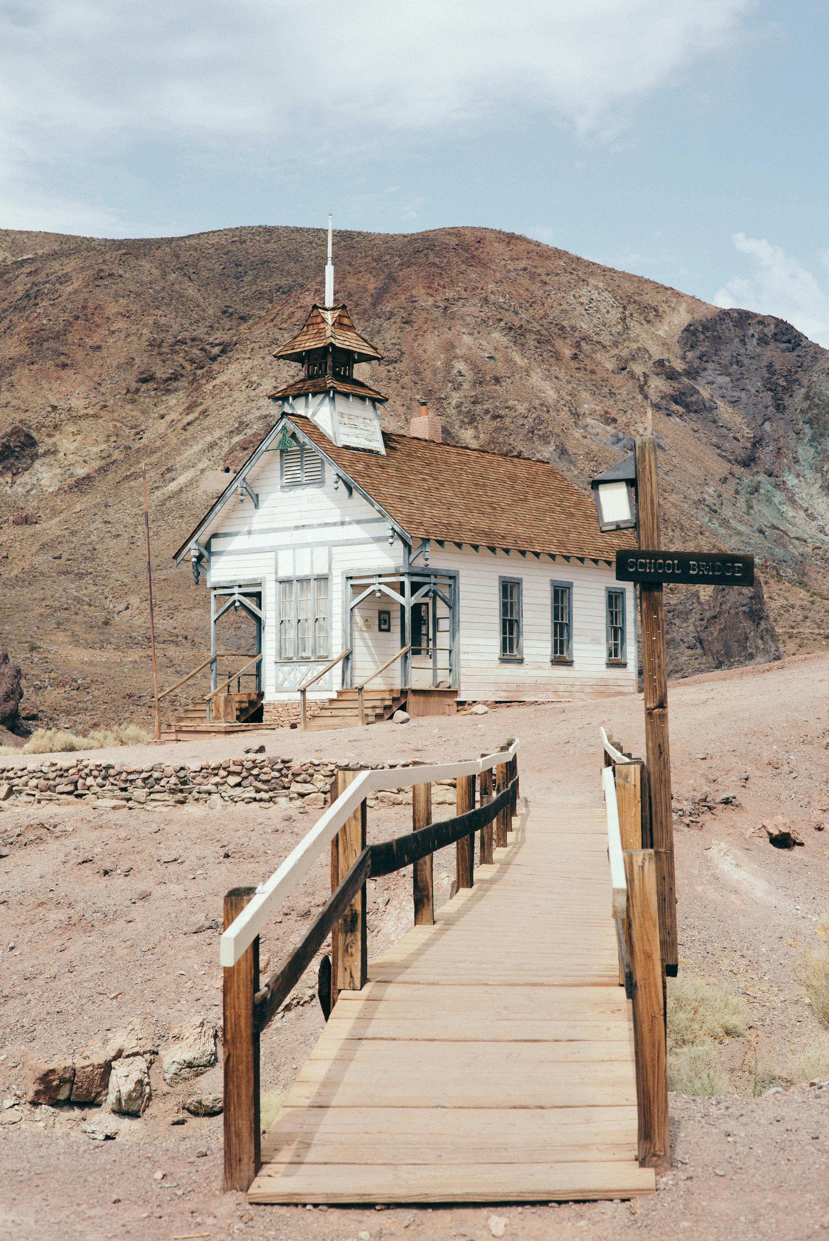Wooden House on Pillars at Mountain Lake · Free Stock Photo