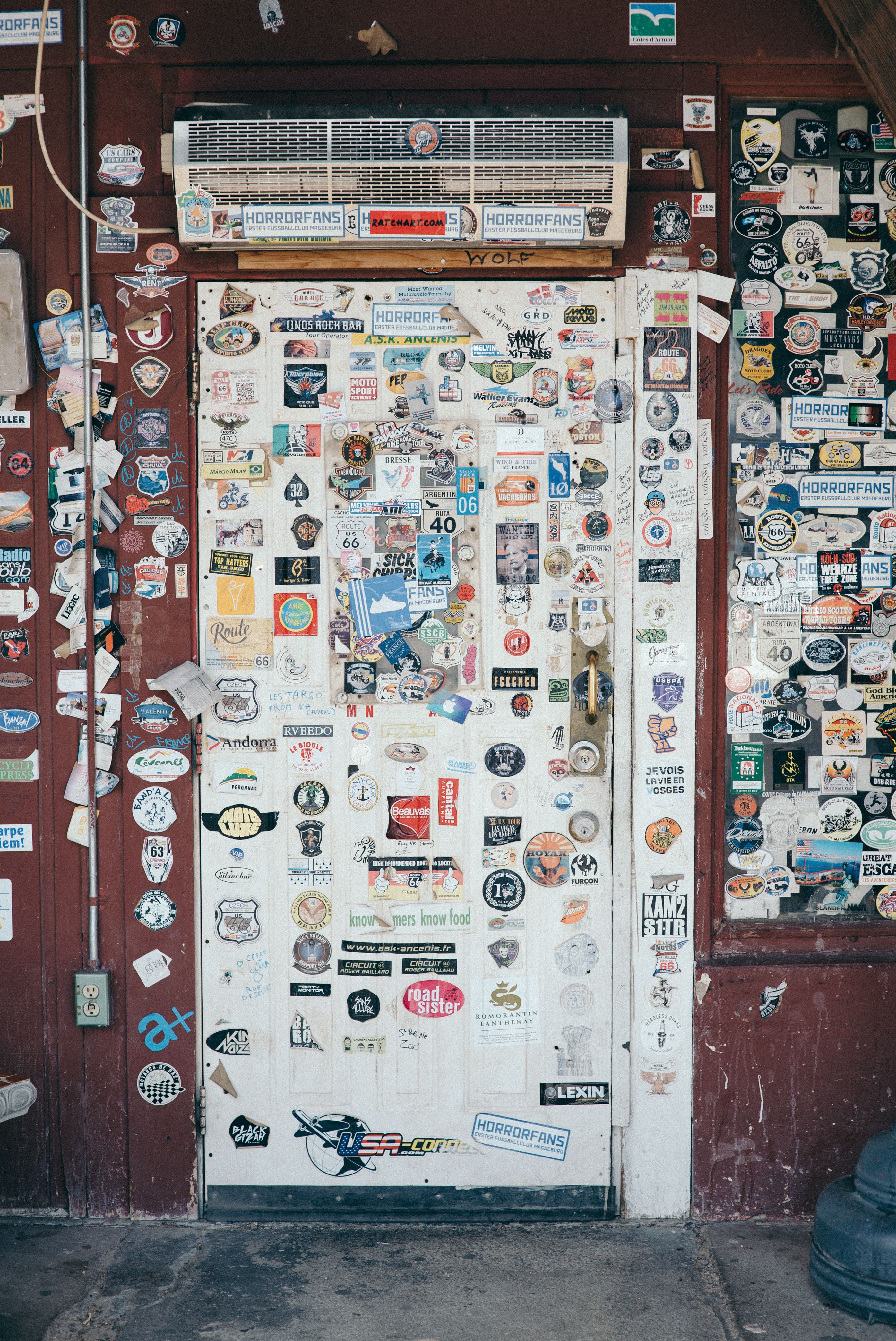 Stickers on the Wall · Free Stock Photo