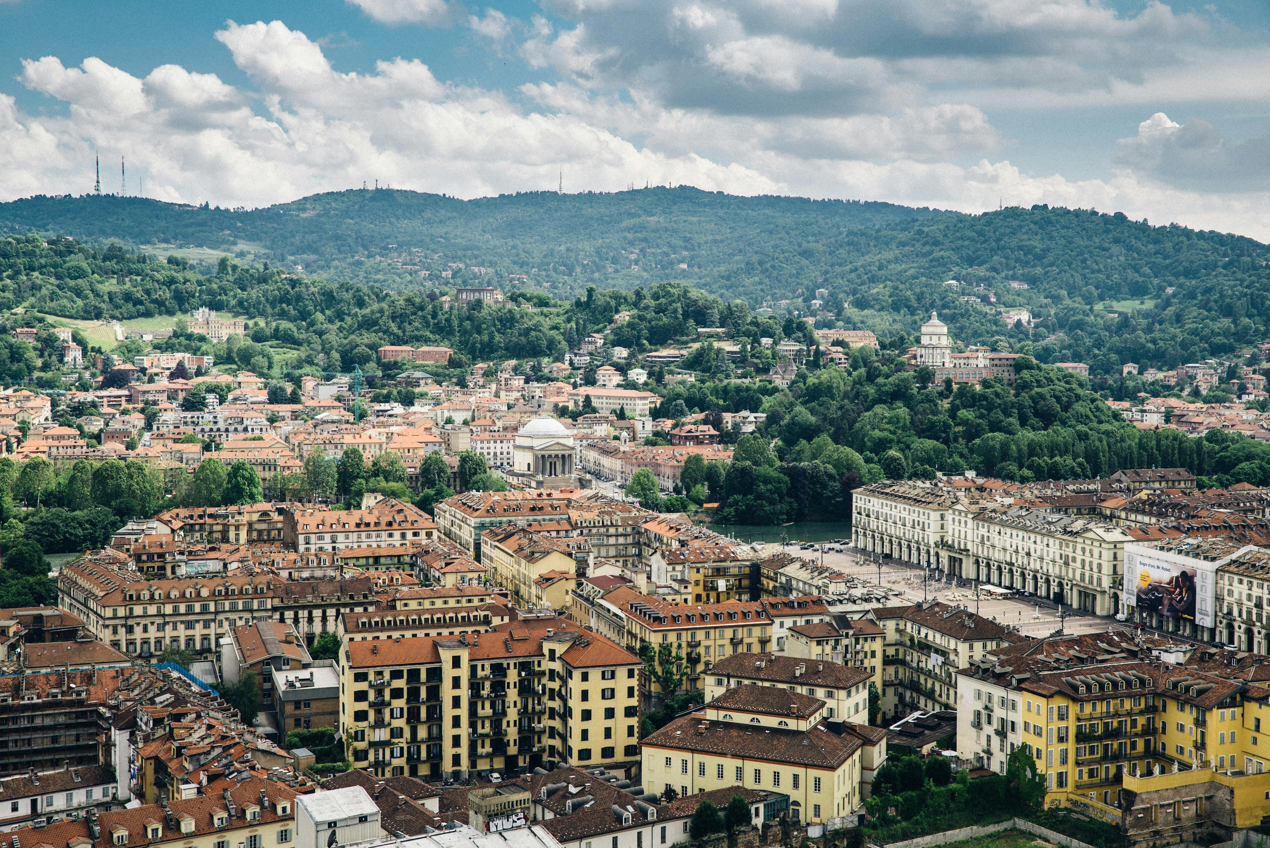 Buildings With Roof Tiles in a City · Free Stock Photo