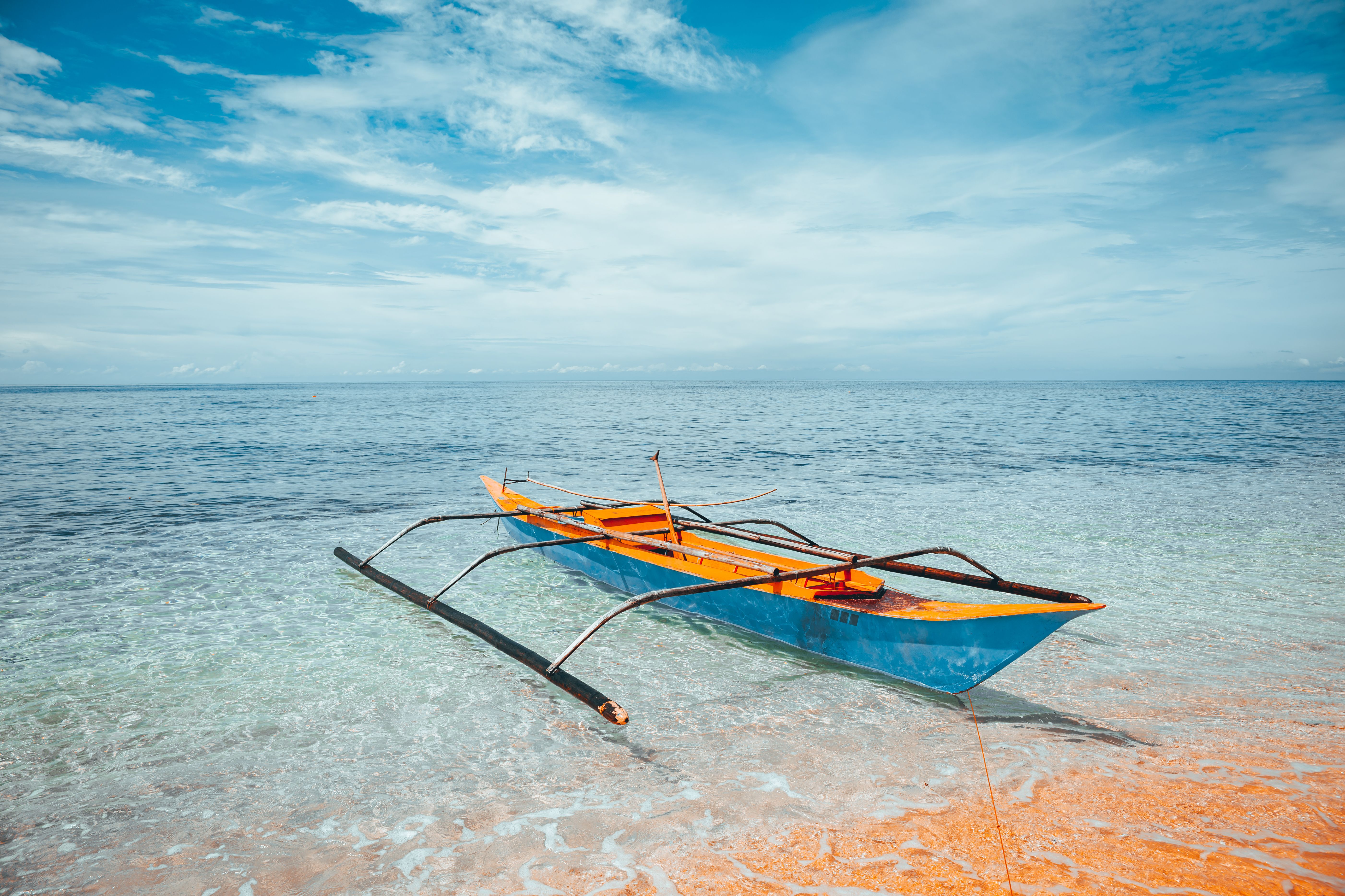 Colorful boat in clean sea · Free Stock Photo