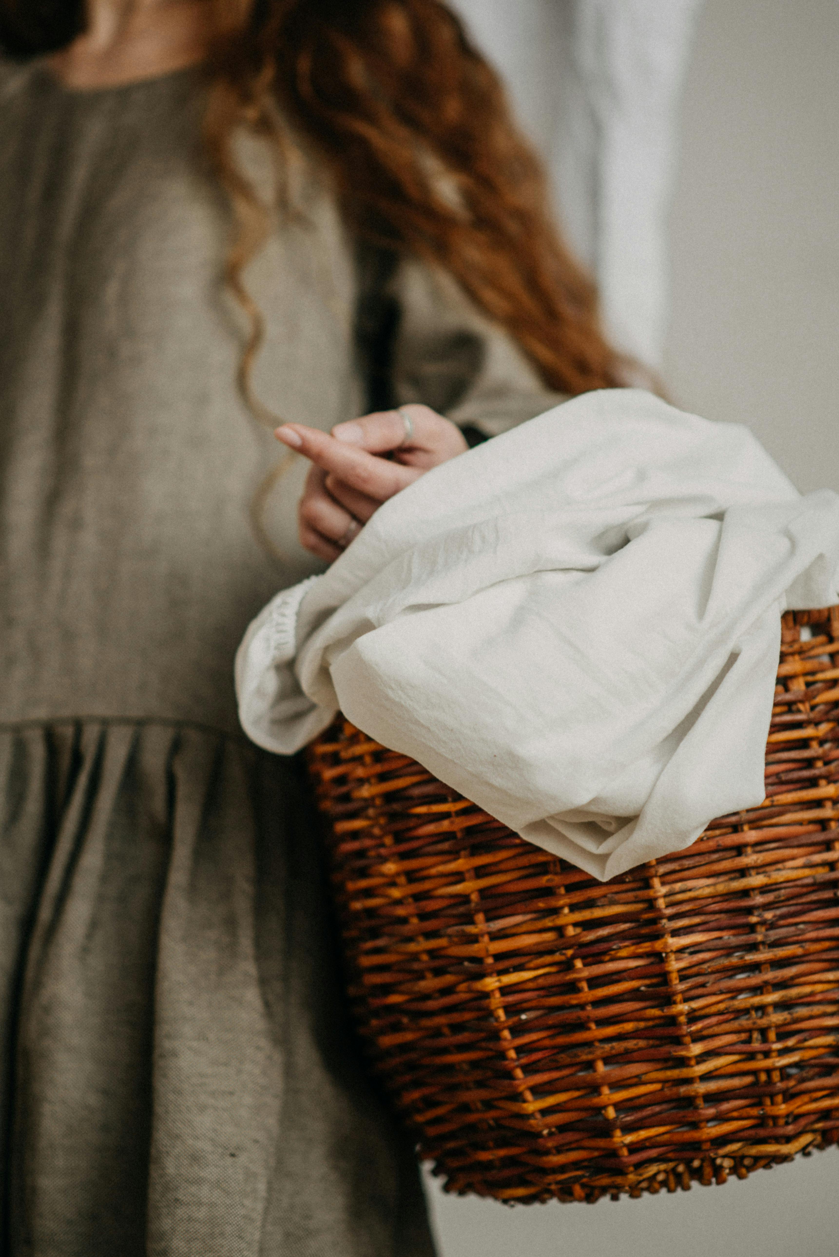 Photo of a Person's Hands Holding a Basket · Free Stock Photo
