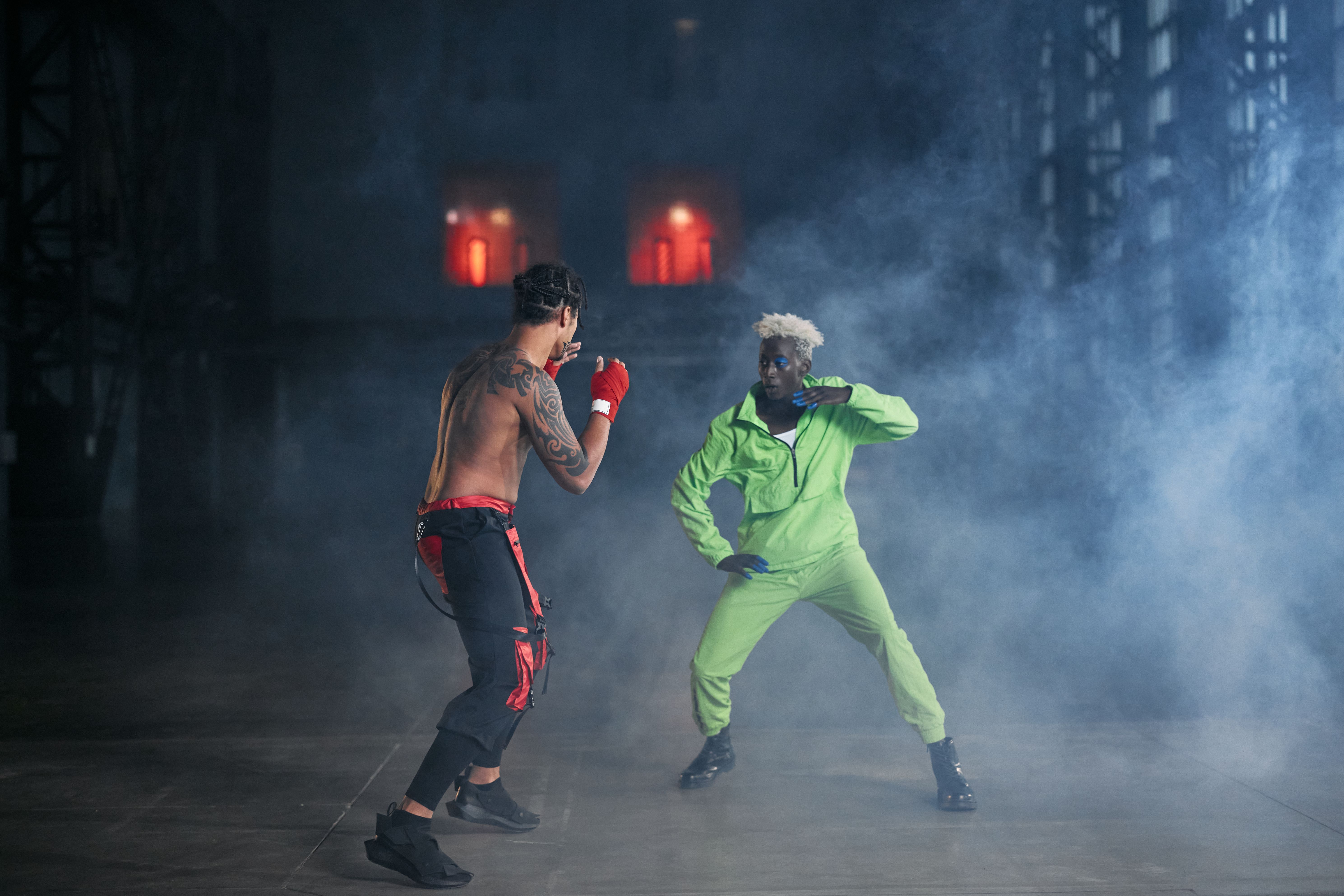 Men Fighting while Wearing Their Game Character Costumes · Free Stock Photo