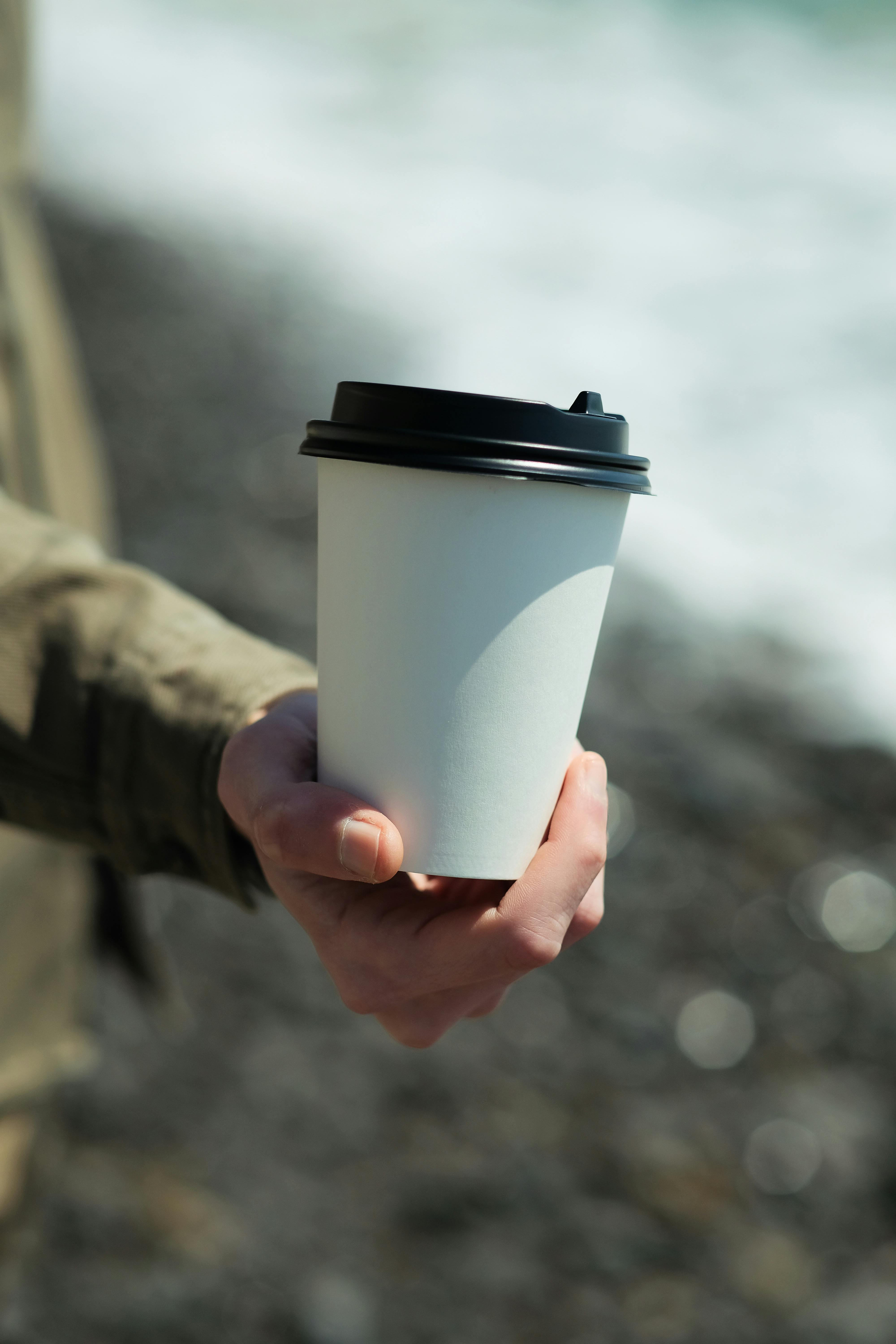 Person Holding White Cup · Free Stock Photo