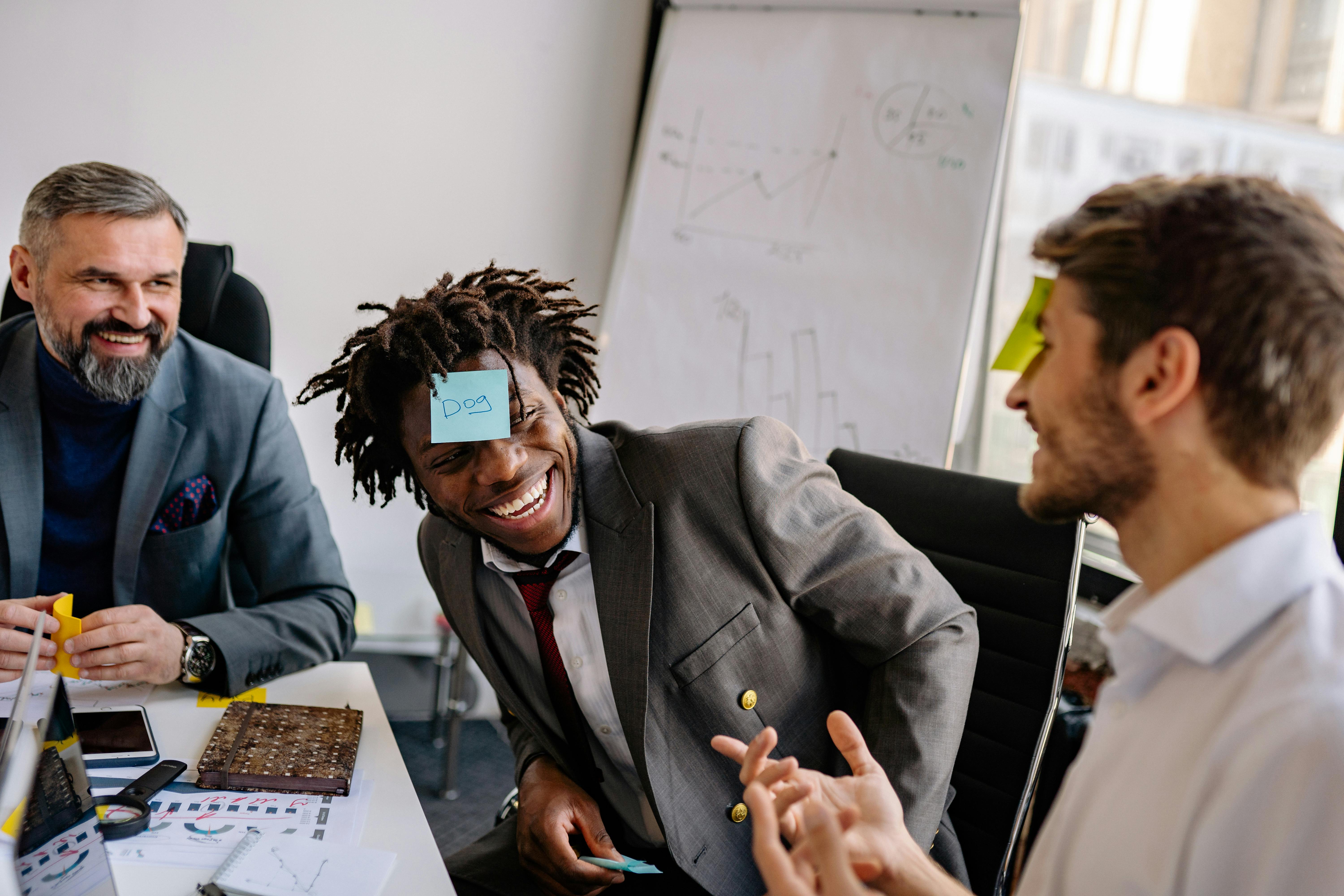 Men Sitting at the Table · Free Stock Photo